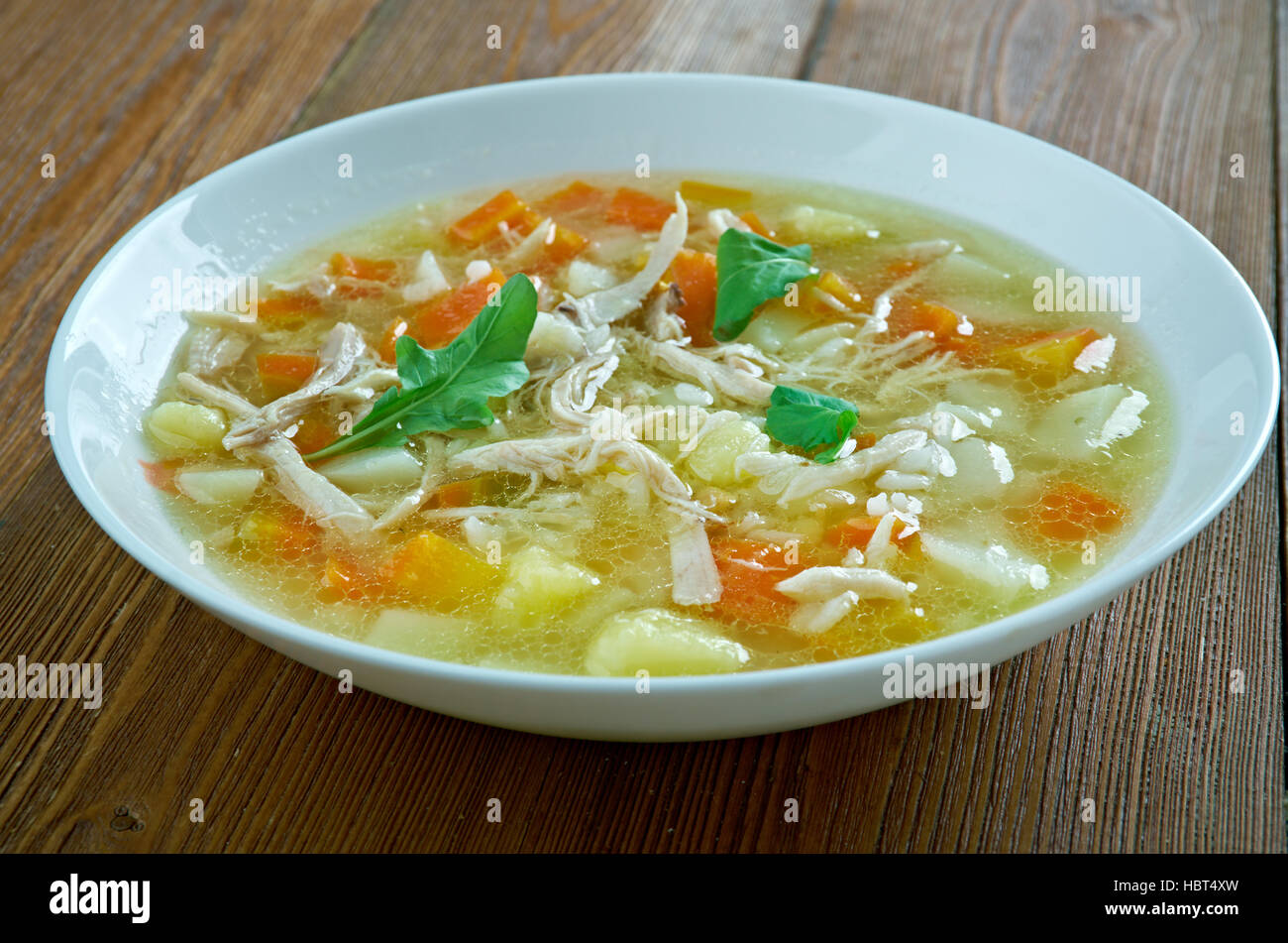 Canja de galinha Portuguese soup with chicken and rice Stock Photo - Alamy