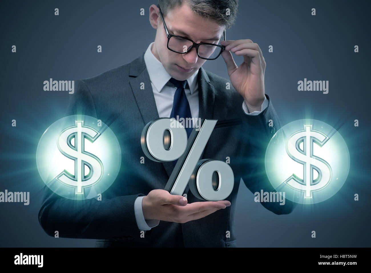 Businessman in high interest rates concept Stock Photo - Alamy