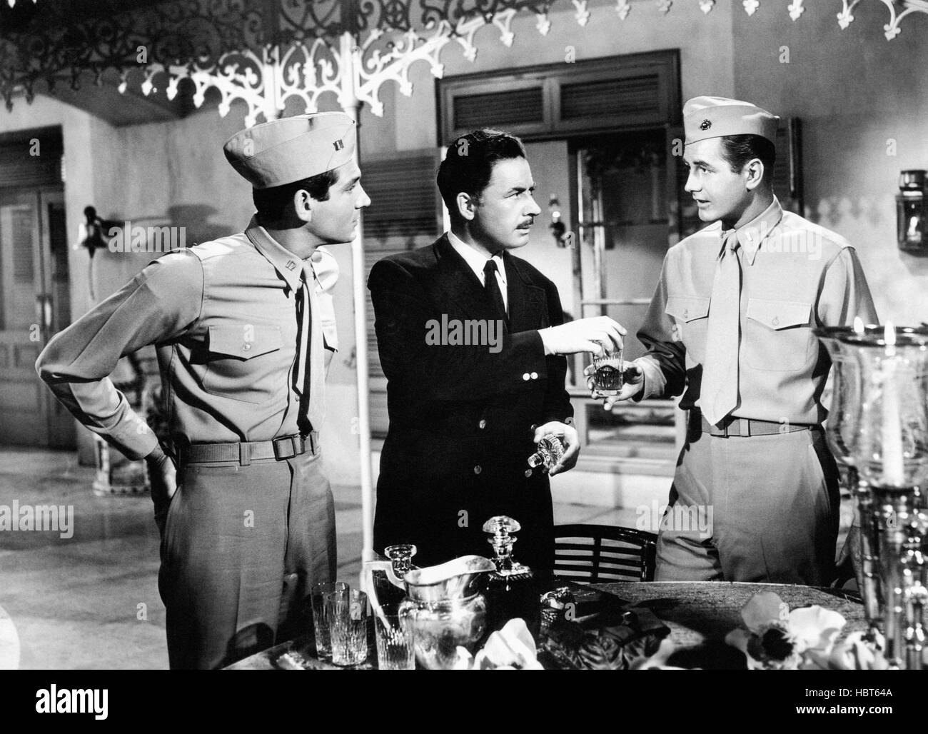 THE GIRLS OF PLEASURE ISLAND, from left, Gene Barry, Leo Genn, Peter Baldwin, 1953 Stock Photo ...