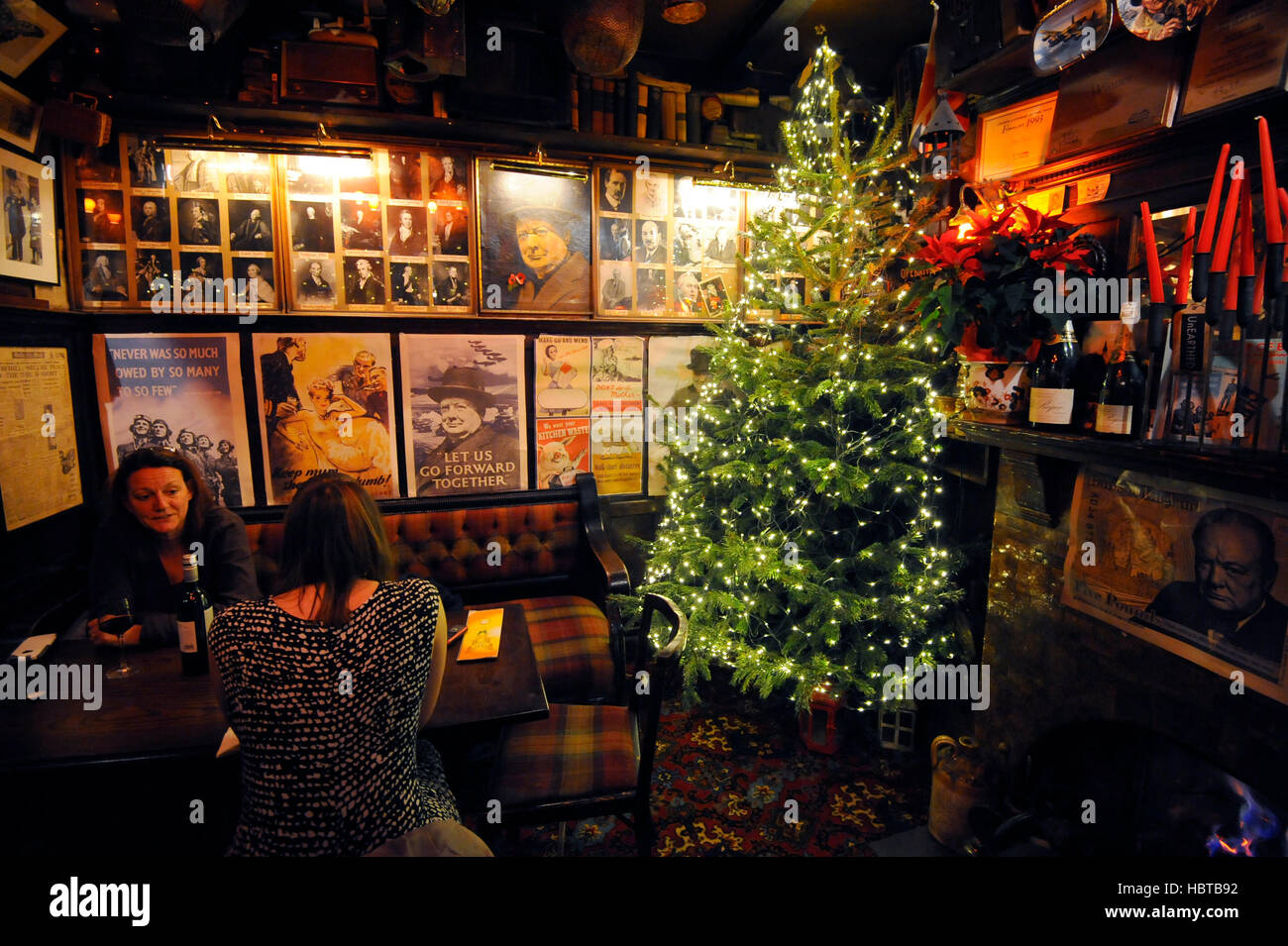 A general view of Christmas decorations inside The Churchill Arms pub ...