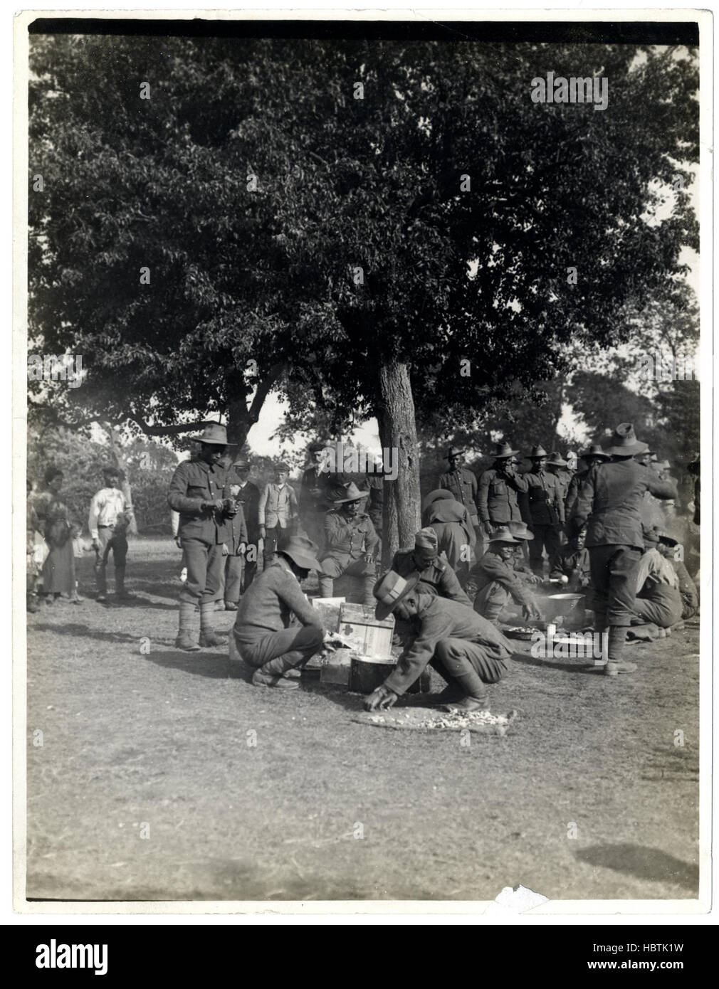 Gurkhas cooking & preparing food [St Floris, France] Photographer H ...