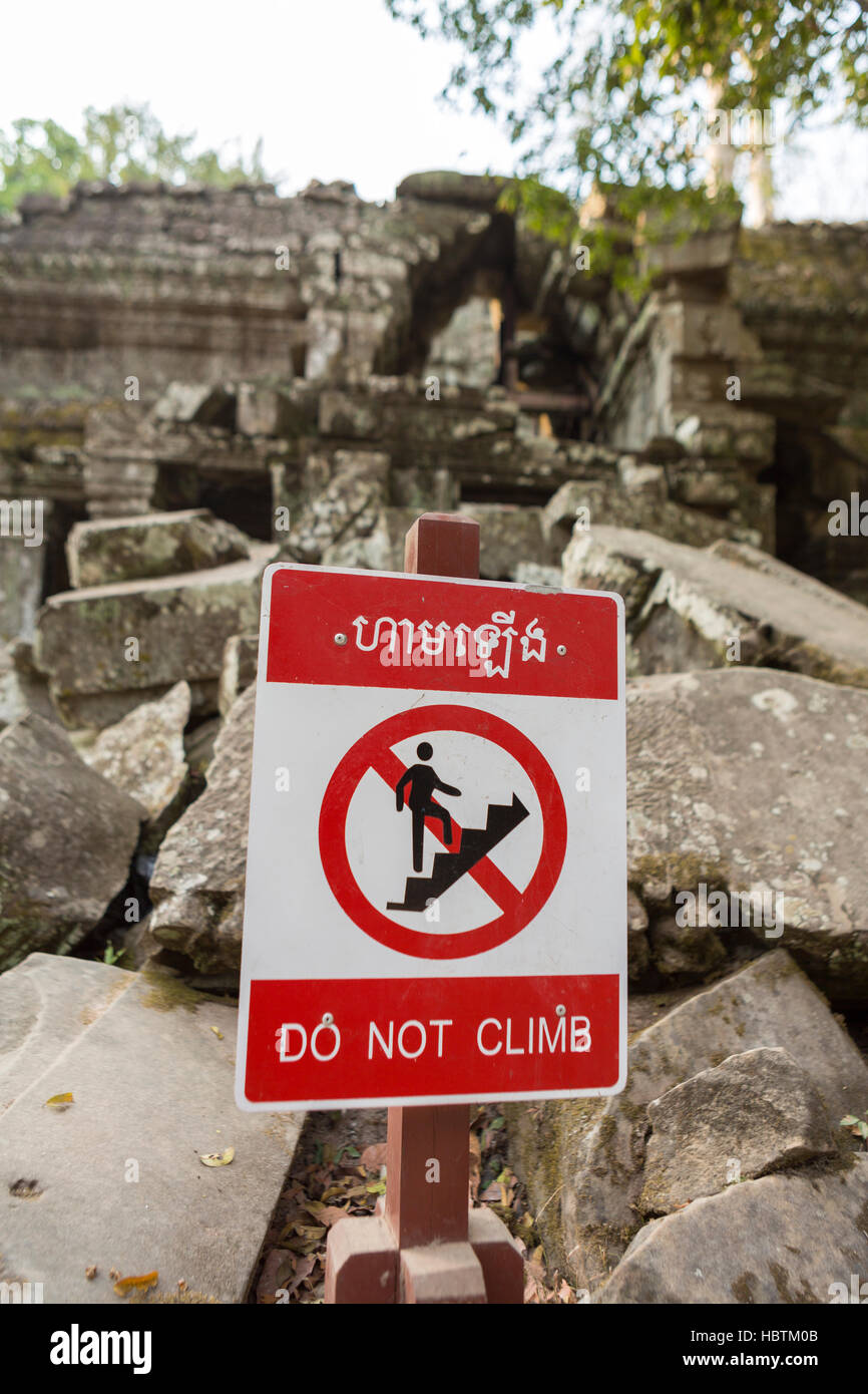Warning sign at Prasat Ta Prohm Temple in Angkor Thom, Cambodia Stock ...