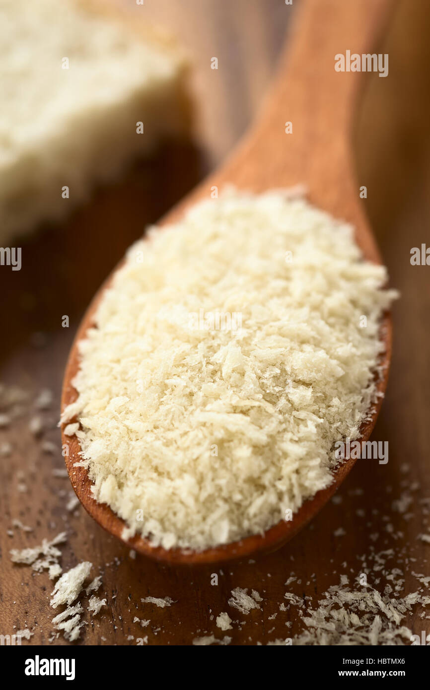 Panko Japanese flaky bread crumbs on wooden spoon, photographed with ...