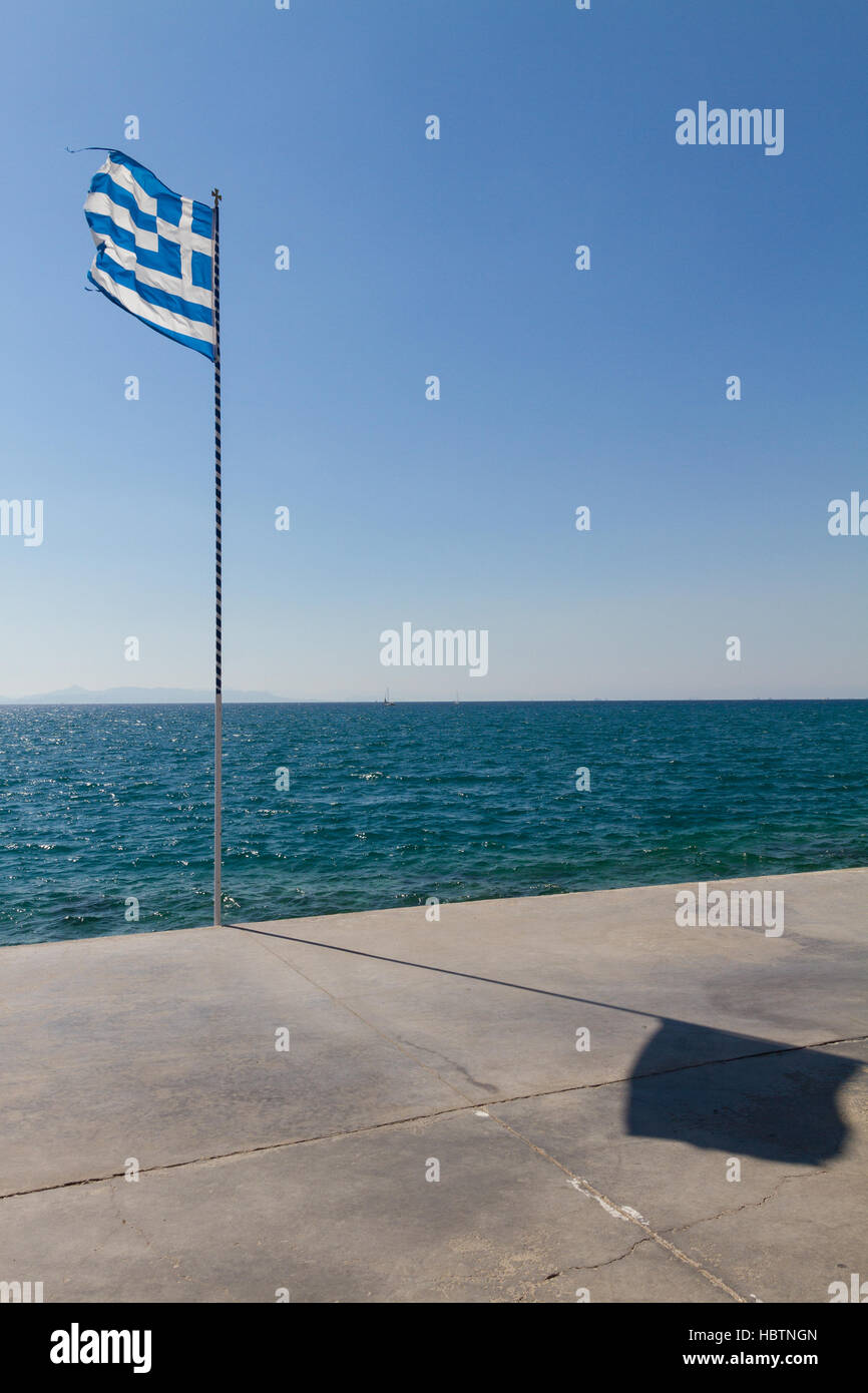 Greek flag and shadow on the promenade in Paleo Faliro in Athens ...