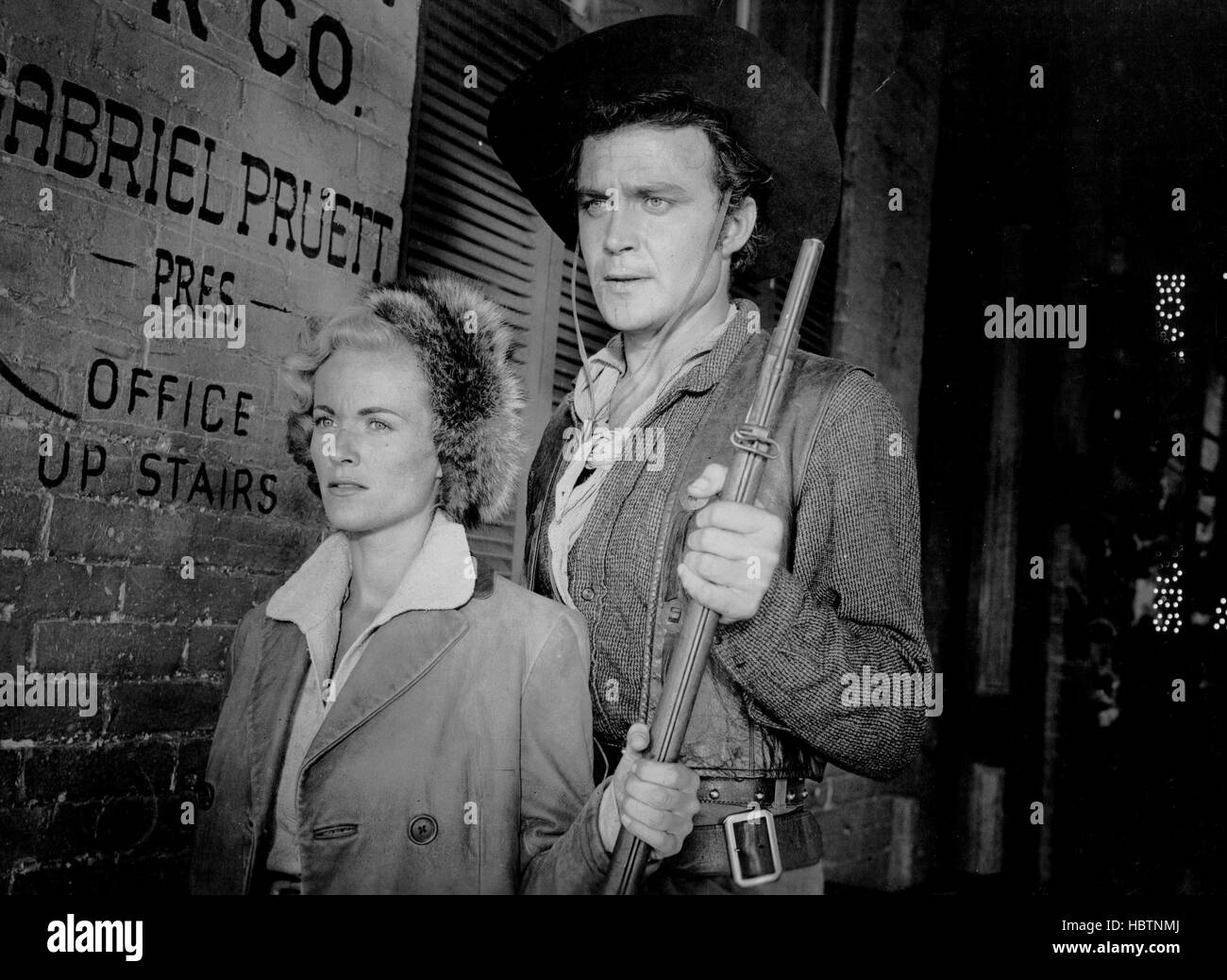 FRONTIER WOMAN, from left, Cindy Carson, Lance Fuller, 1956 Stock Photo ...