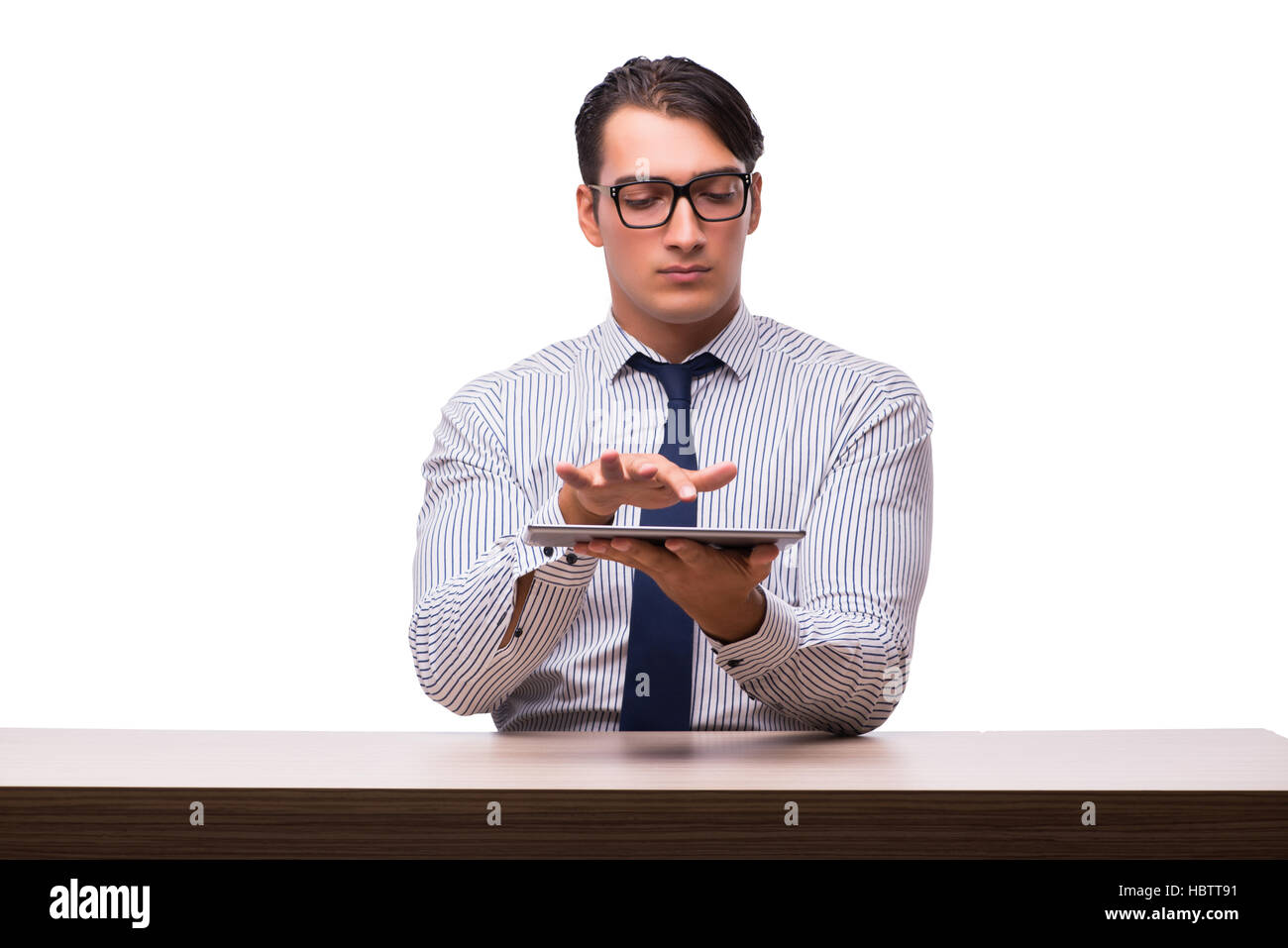 Businessman using his tablet computer isolated on white Stock Photo - Alamy