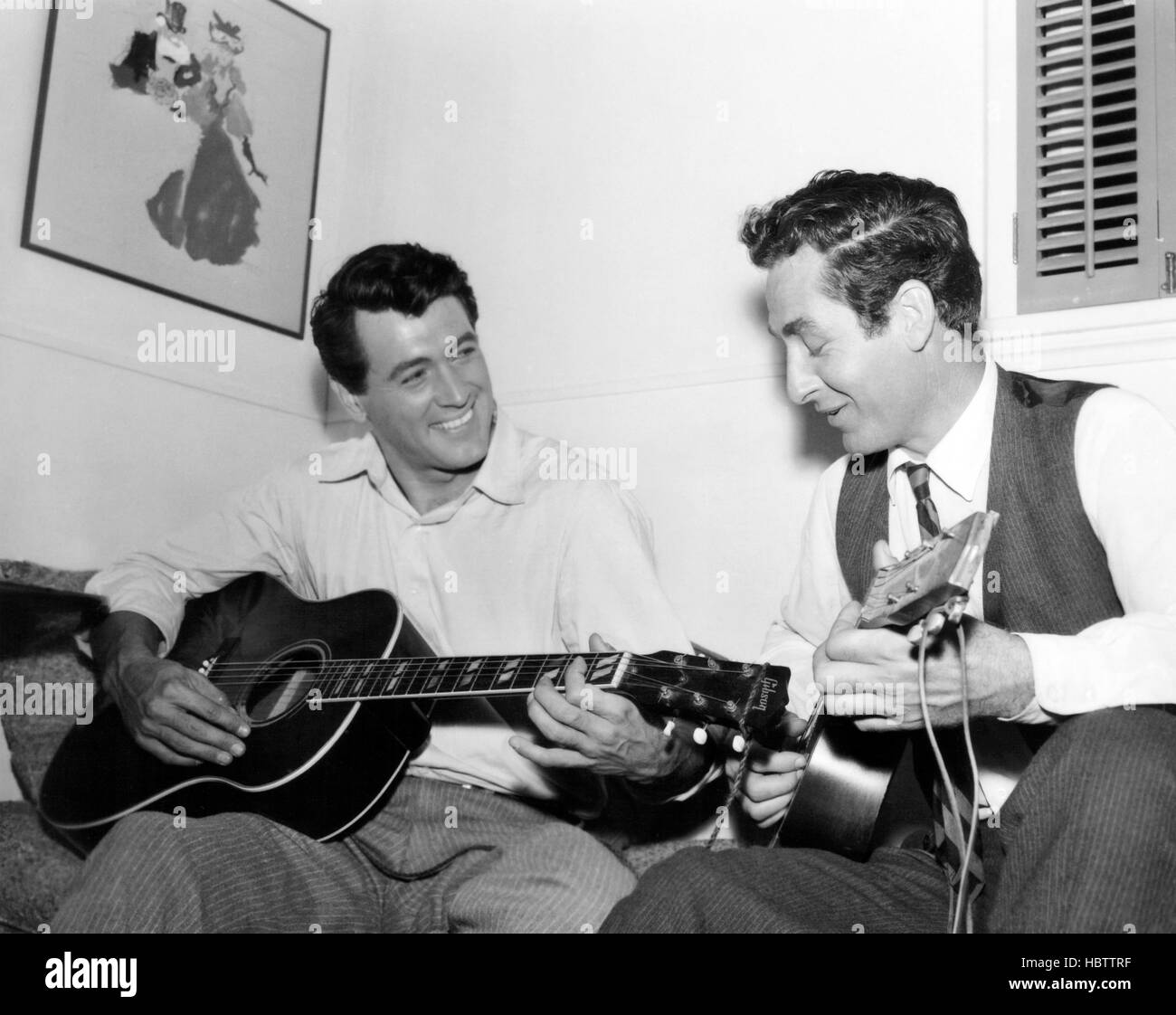 GIANT, from left: Rock Hudson, Sheb Wooley, playing guitar between ...