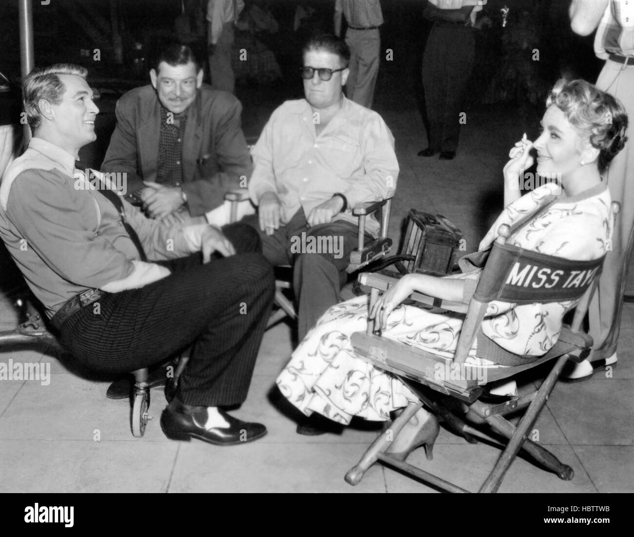 GIANT, from left, Rock Hudson, screenwriter Fred Guiol, director George ...
