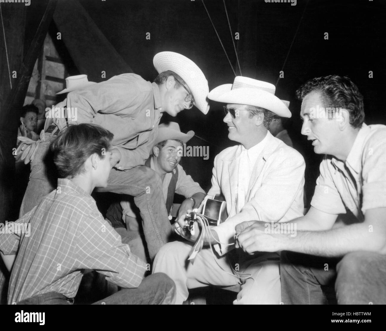 GIANT, from left, James Dean, Monte Hale, Robert Hinkle, (with two ...