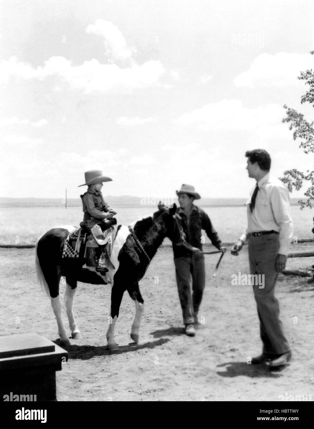 GIANT, from left, Steven Kay, Victor Millan, Rock Hudson, 1956 Stock ...
