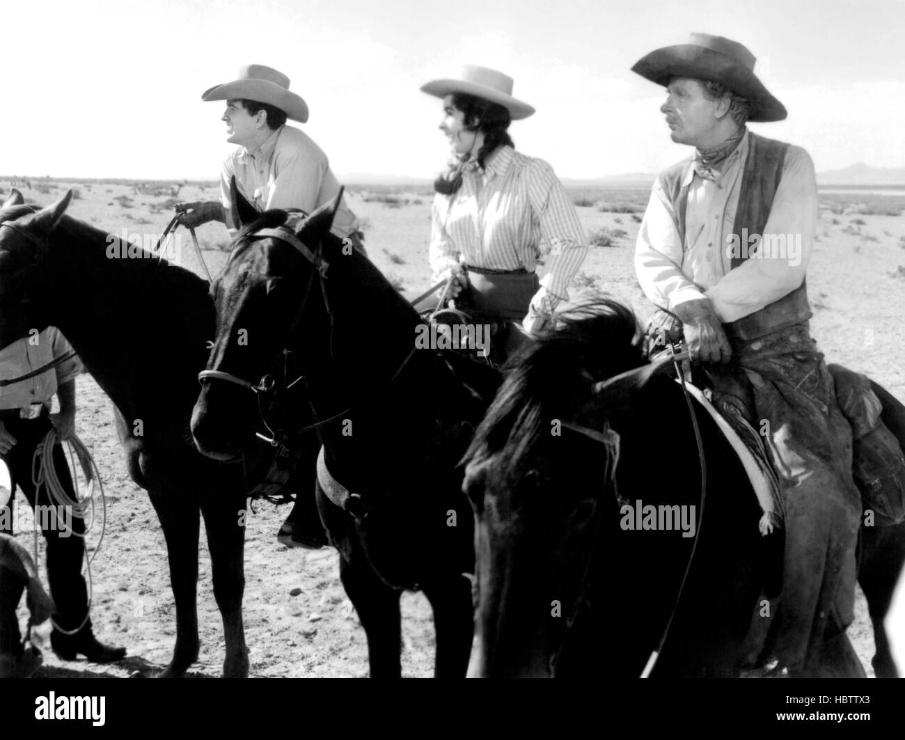 GIANT, from left, Rock Hudson, Elizabeth Taylor, Alexander Scourby ...