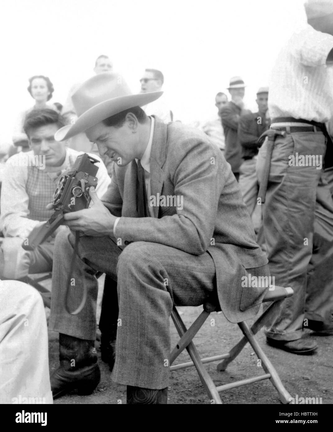 GIANT, from left, Rod Taylor, Rock Hudson, on location, 1956 Stock ...