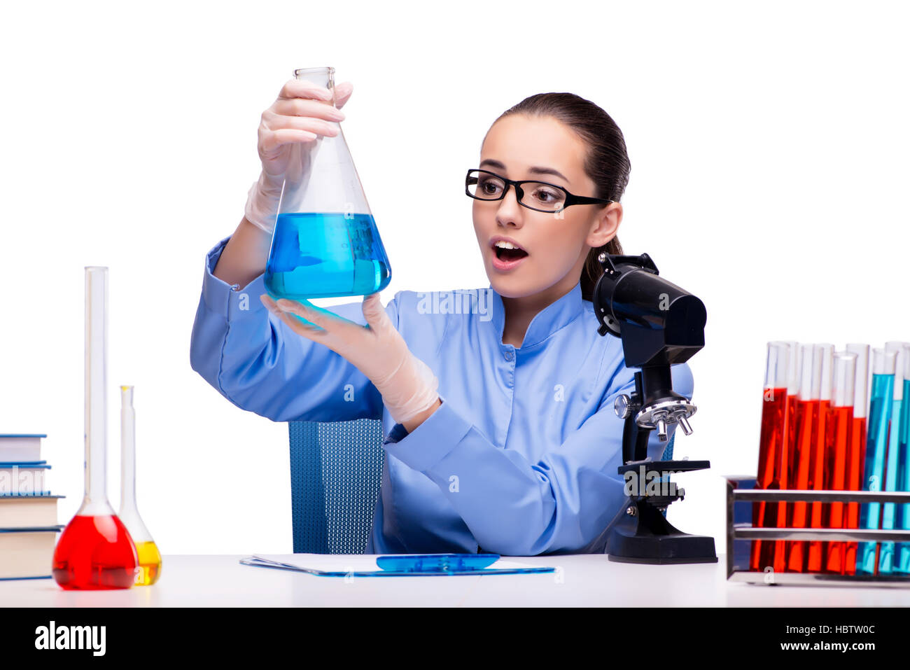Lab chemist working with microscope and tubes Stock Photo - Alamy
