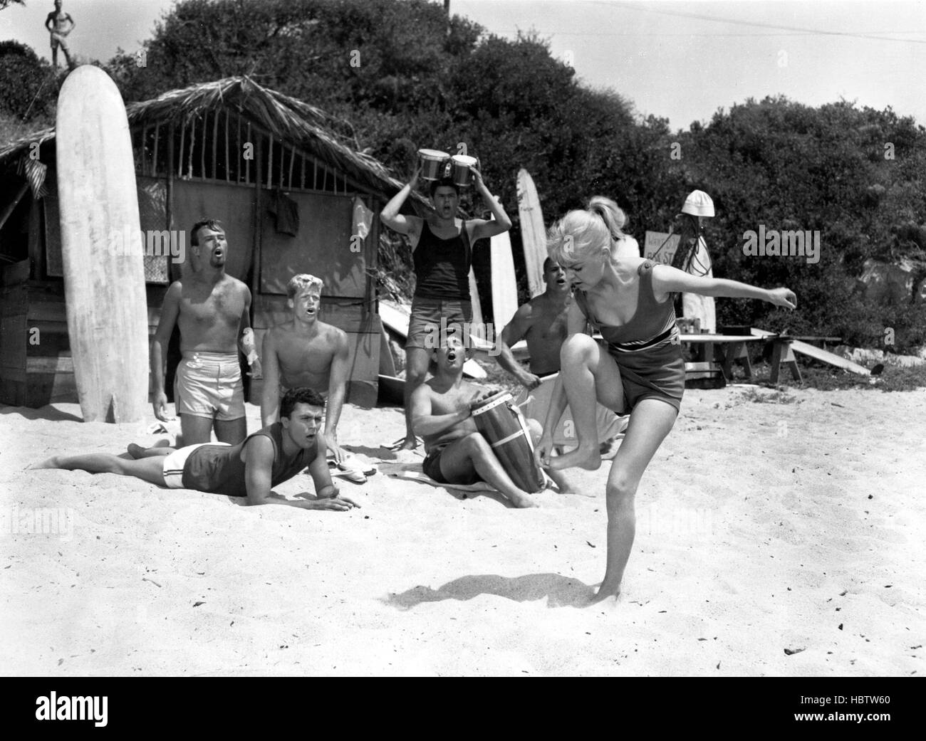 GIDGET, James Darren (left, bottom, in shirt), Sandra Dee (foreground right), 1959 Stock Photo ...
