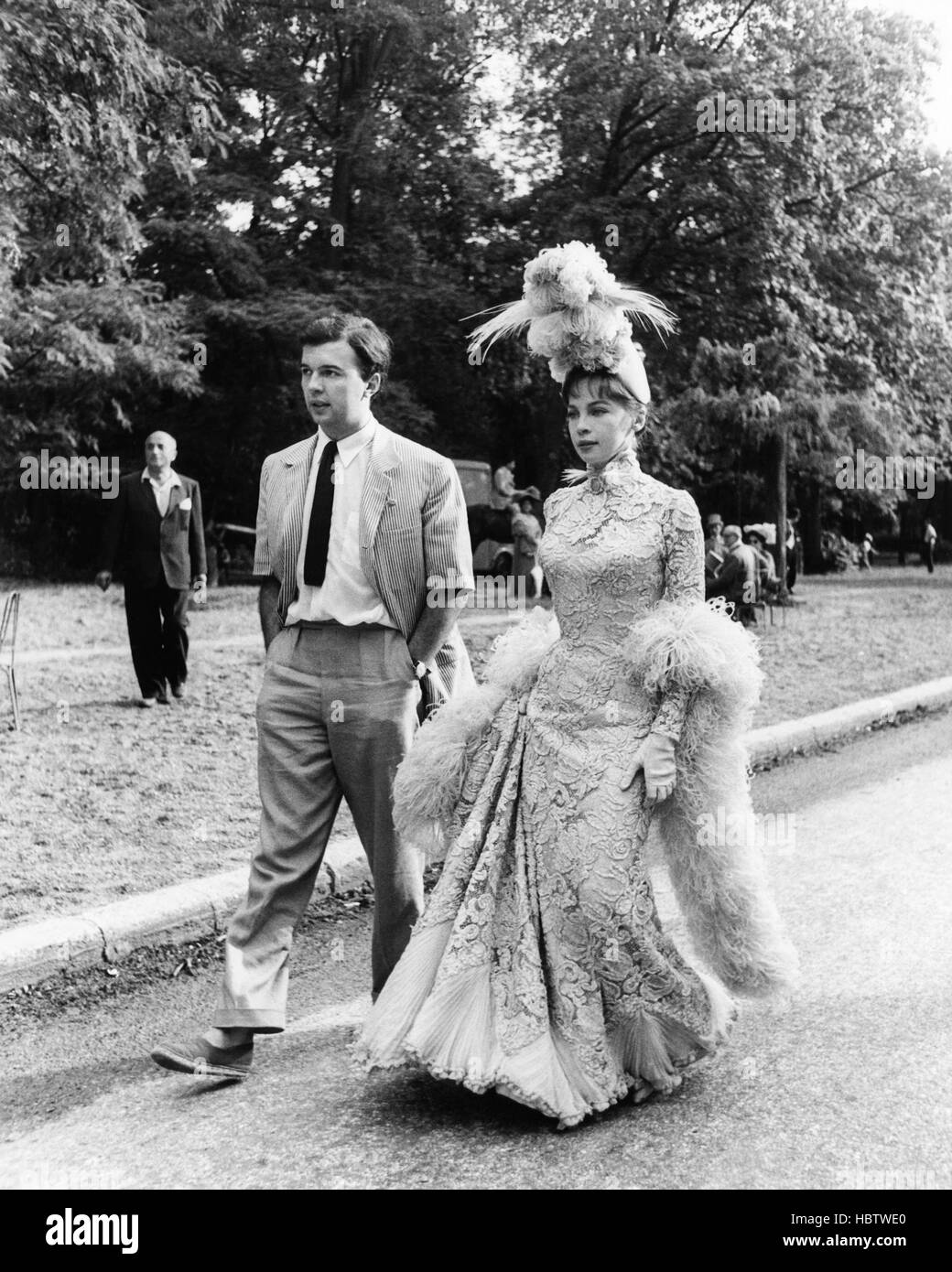 GIGI, Leslie Caron with husband, Peter Hall strolling through park ...