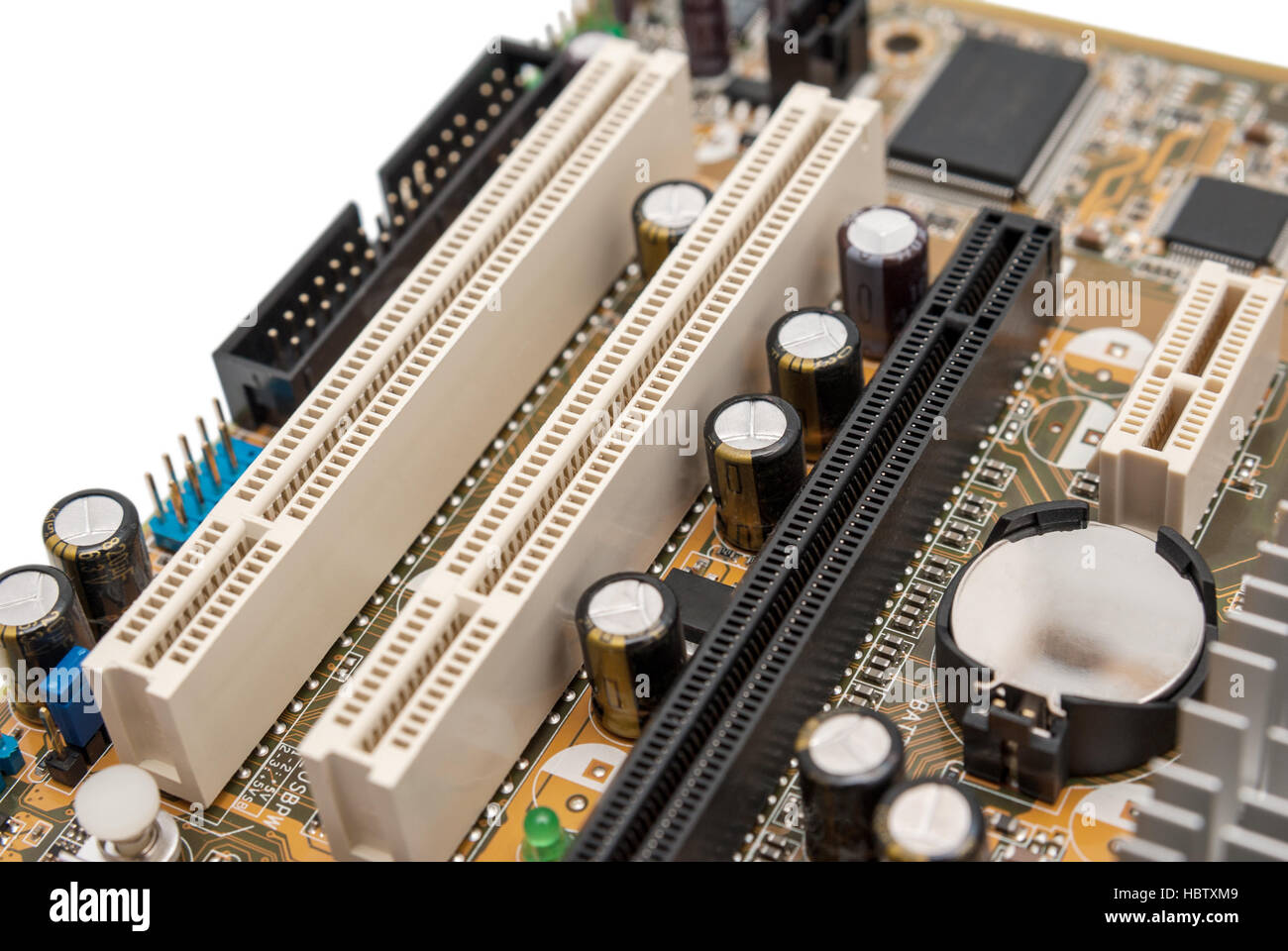 Electronics components on modern PC computer motherboard with PCI ...