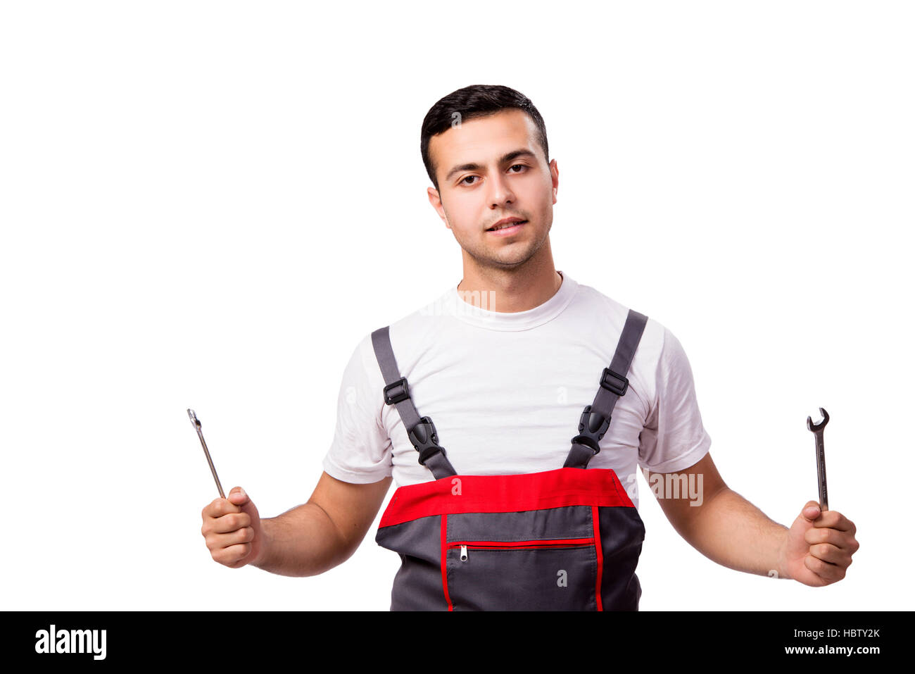 The man with wrench isolated on white Stock Photo - Alamy
