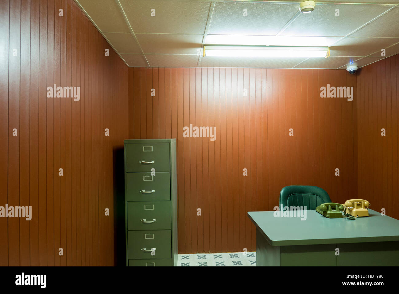 Old desk and chair in small office with vintage rotary phones, Saigon ...