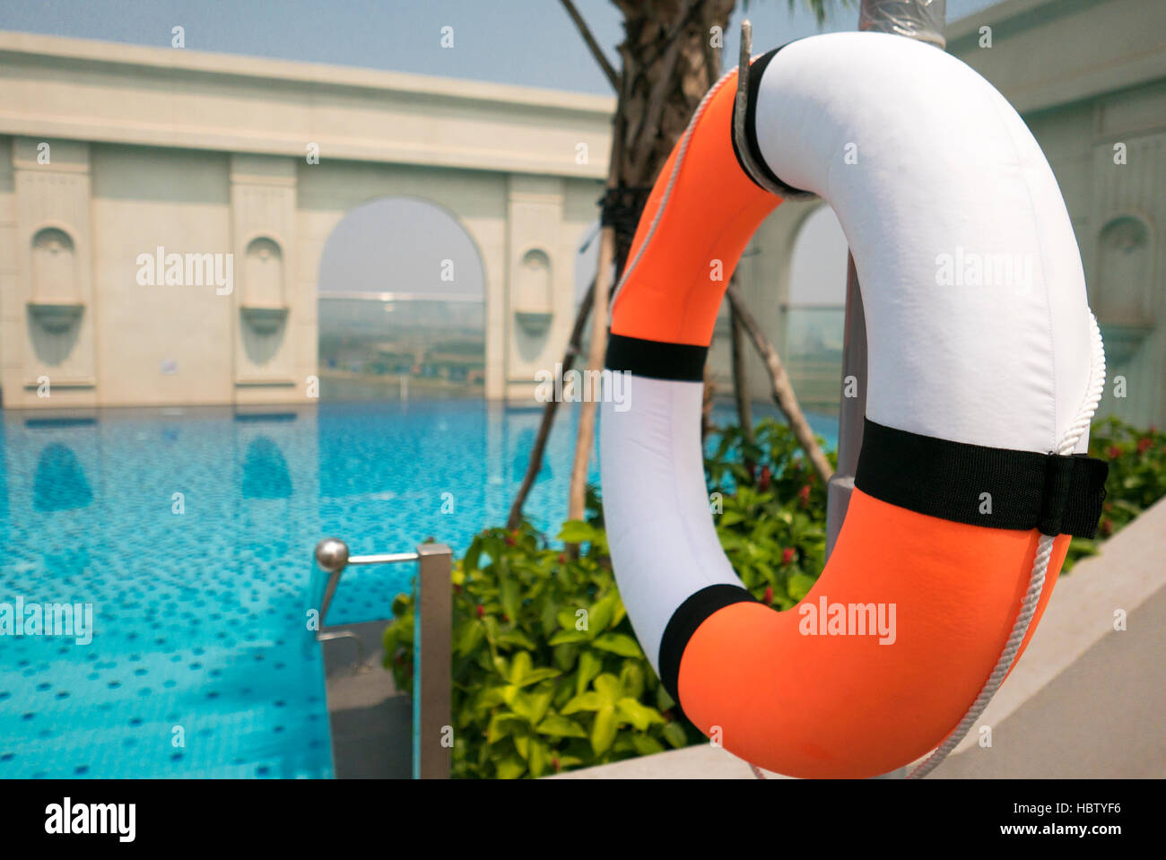Life buoy and Pool on top of building with Saigon aerial view, Vietnam ...