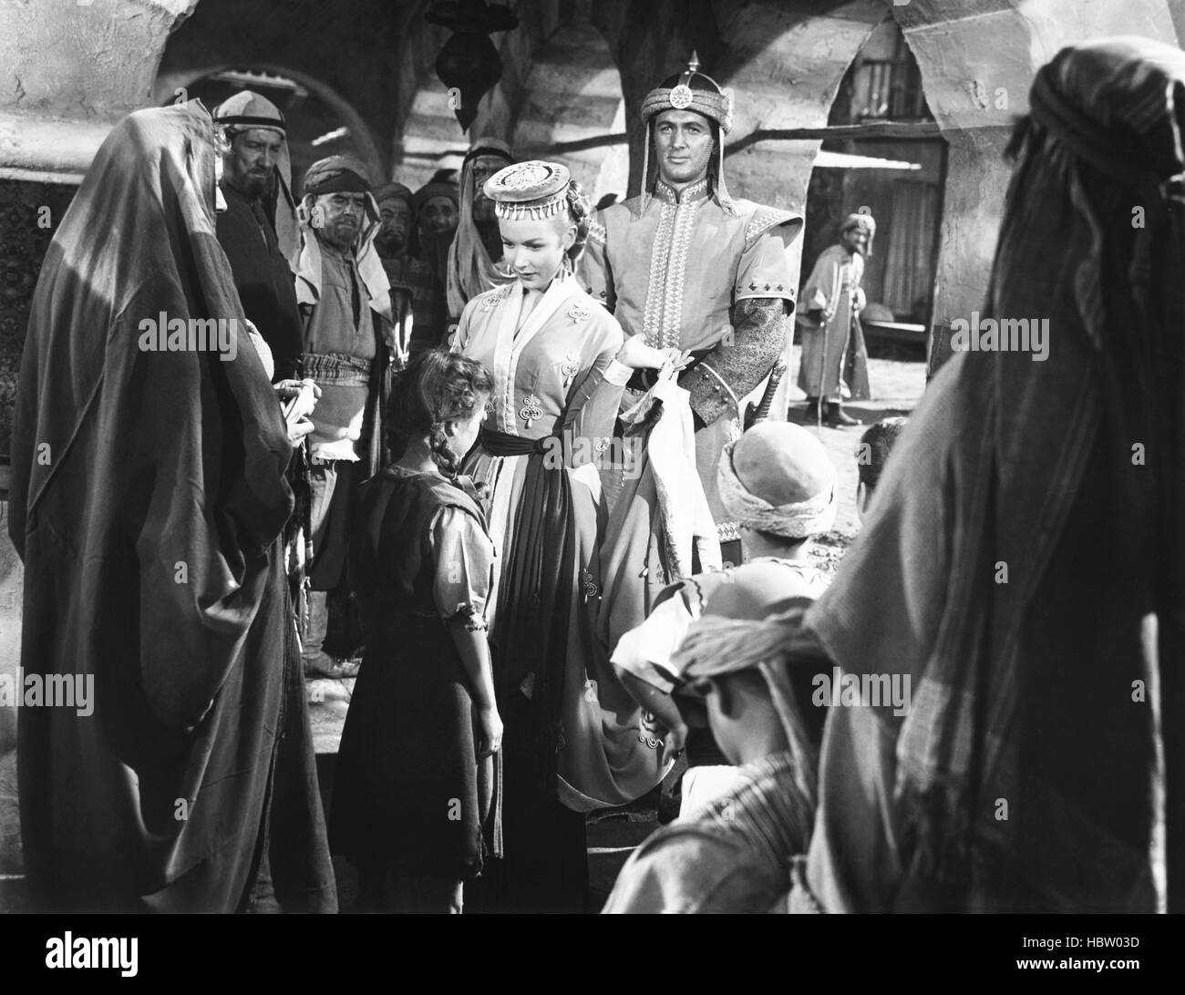 THE GOLDEN BLADE, Piper Laurie (center), Rock Hudson (rear), 1953 Stock ...