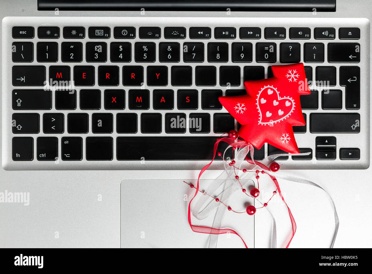 merry christmas in keyboard of computer Stock Photo - Alamy