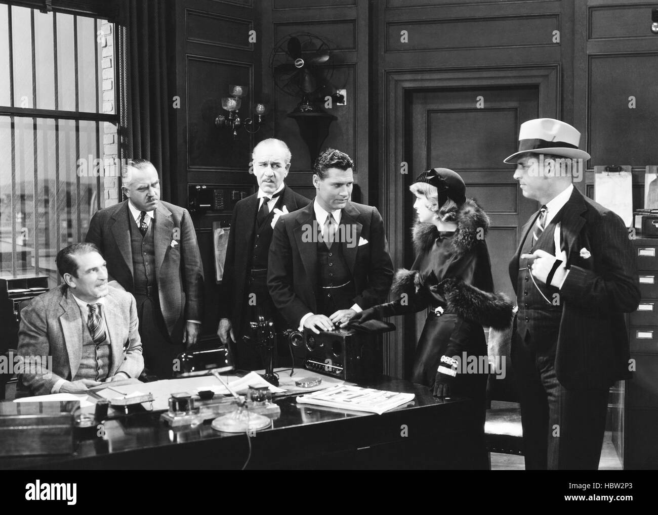 GUILTY AS HELL, from left: Victor McLaglen, Fred Kelsey, Henry Stephenson, Richard Arlen ...