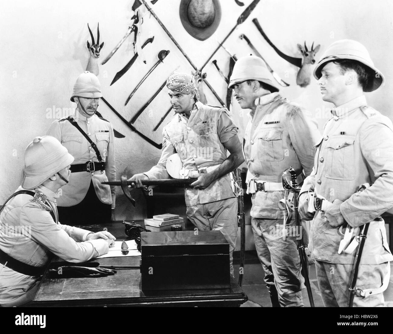 GUNGA DIN, standing from left: Lumsden Hare, Cary Grant, Victor ...