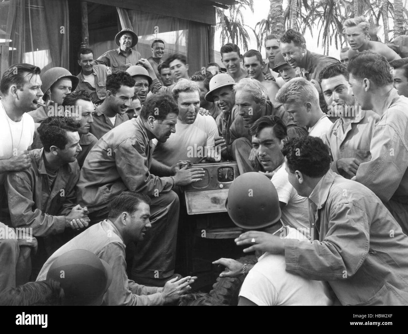 GUADALCANAL DIARY , at radio from left: Lionel Stander, William Bendix ...