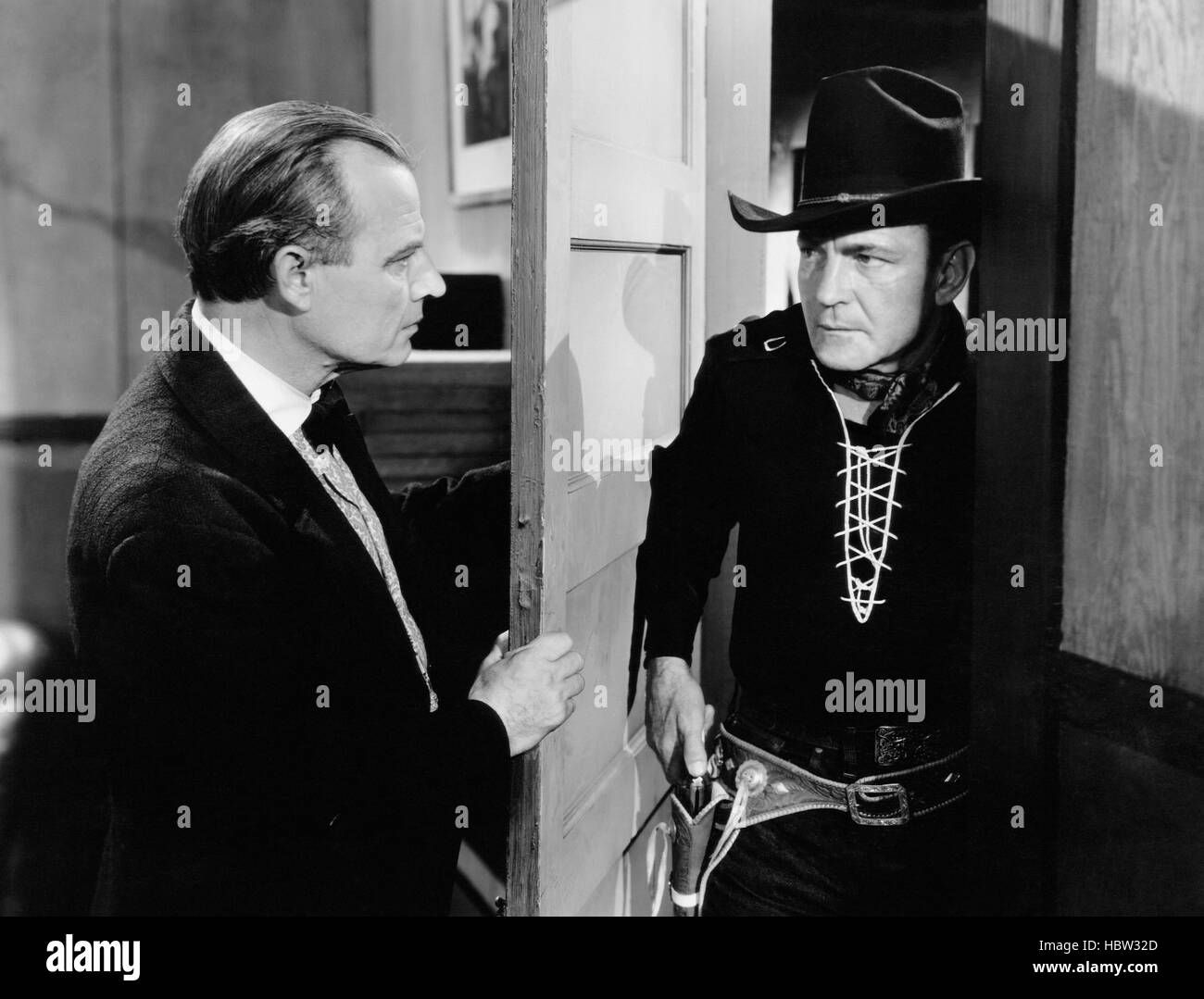 THE GUNMAN FROM BODIE, from left: Robert Frazer, Buck Jones, 1941 Stock ...