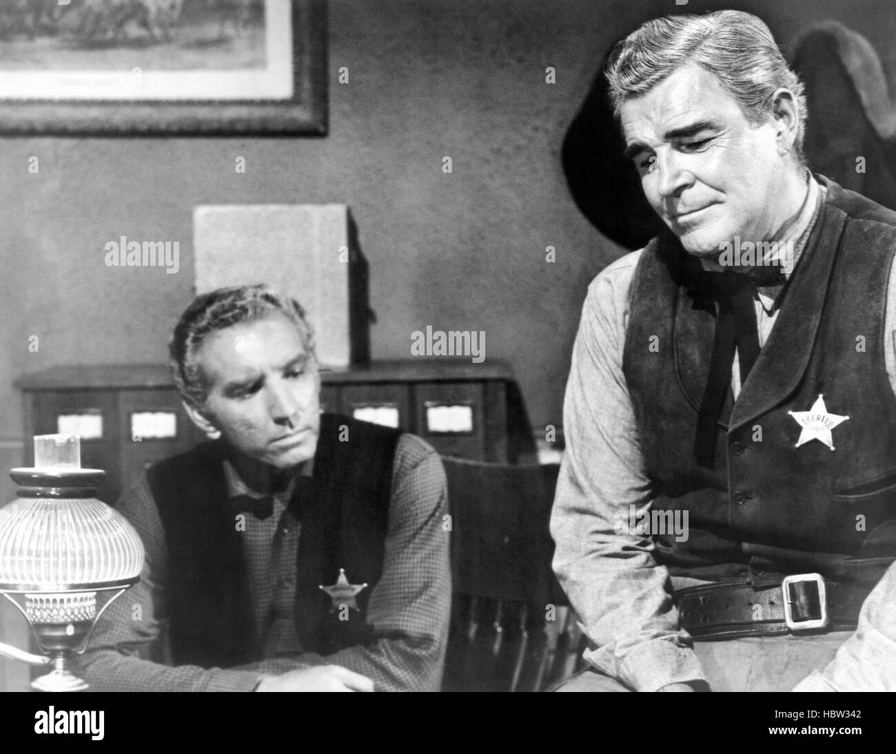 THE GUN HAWK, from left: Morgan Woodward, Rod Cameron, 1963 Stock Photo ...