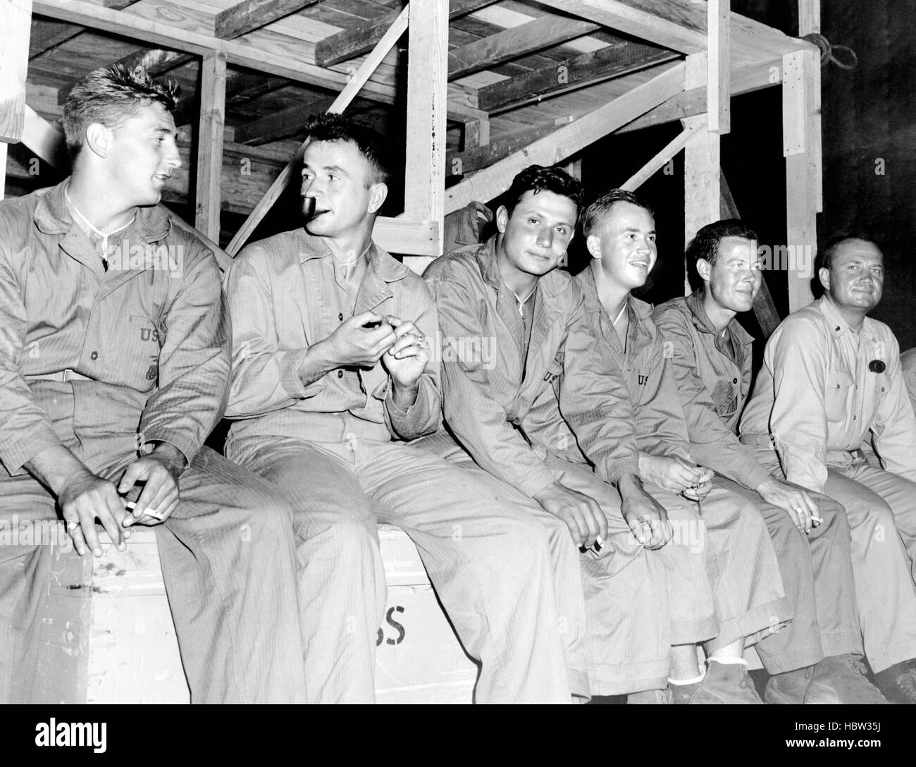 GUNG HO!, from left, on-set, Robert Mitchum, Noah Beery, Jr., Peter Coe ...