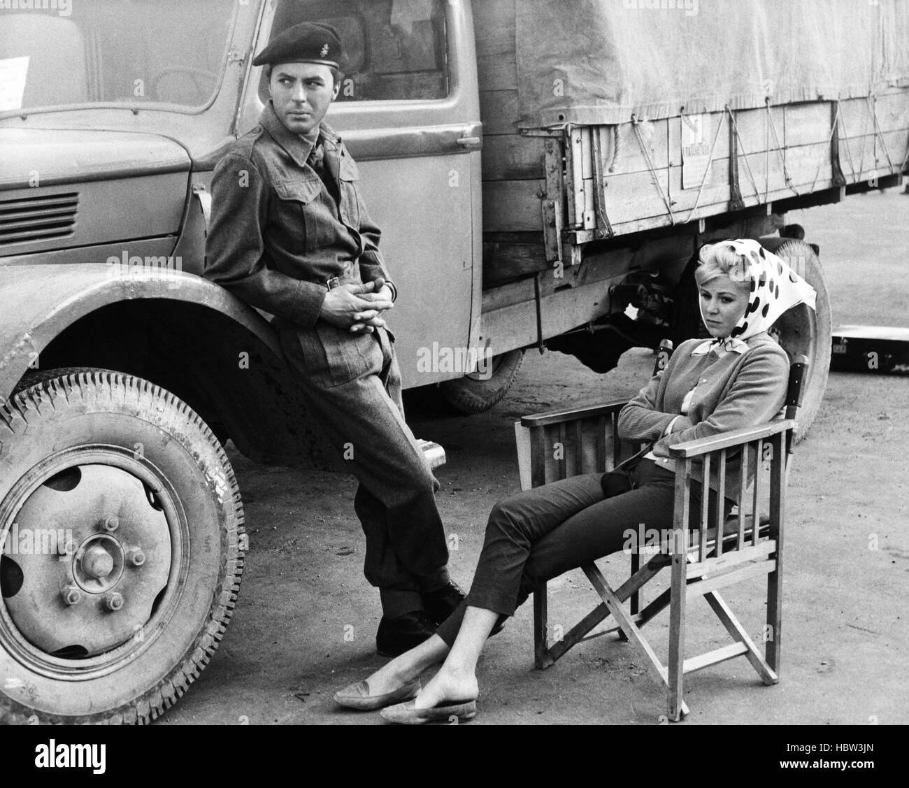 THE GUNS OF NAVARONE, Evy Norlund (right) visits with her husband ...