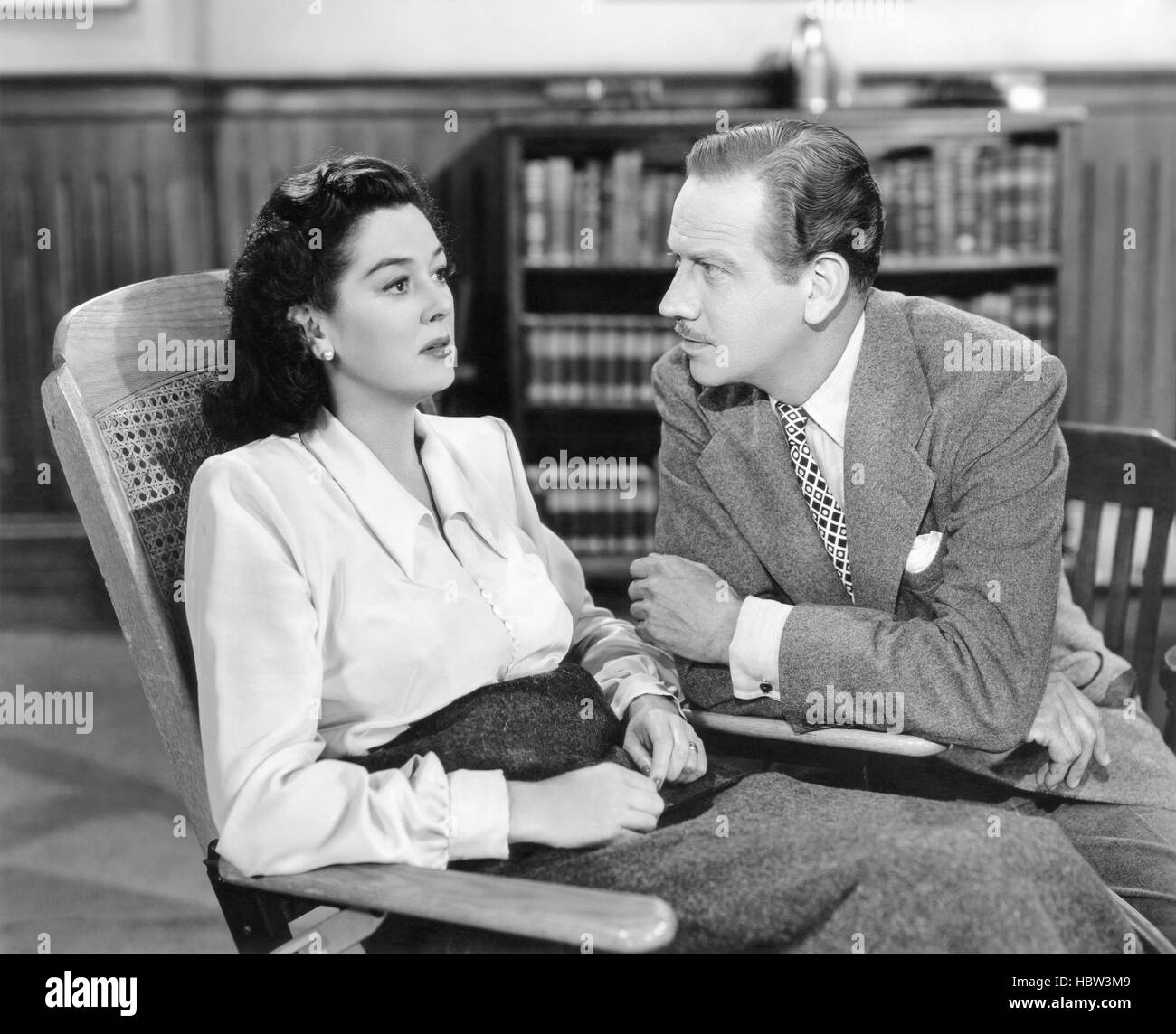 THE GUILT OF JANET AMES, from left: Rosalind Russell, Melvyn Douglas ...