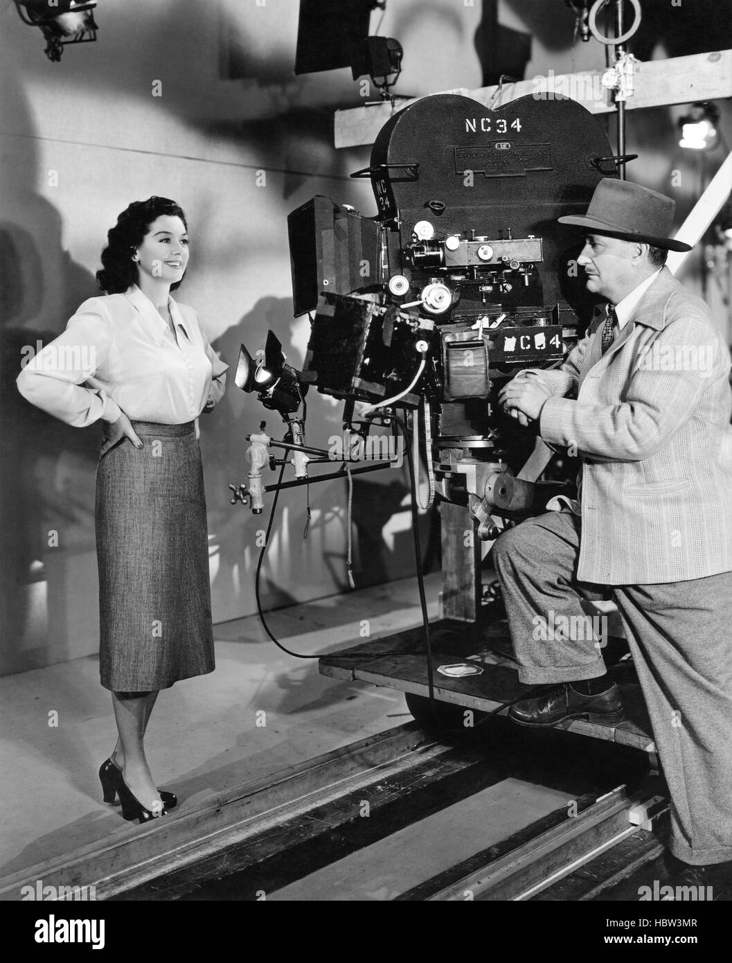 THE GUILT OF JANET AMES, from left: Rosalind Russell, cameraman Joseph ...