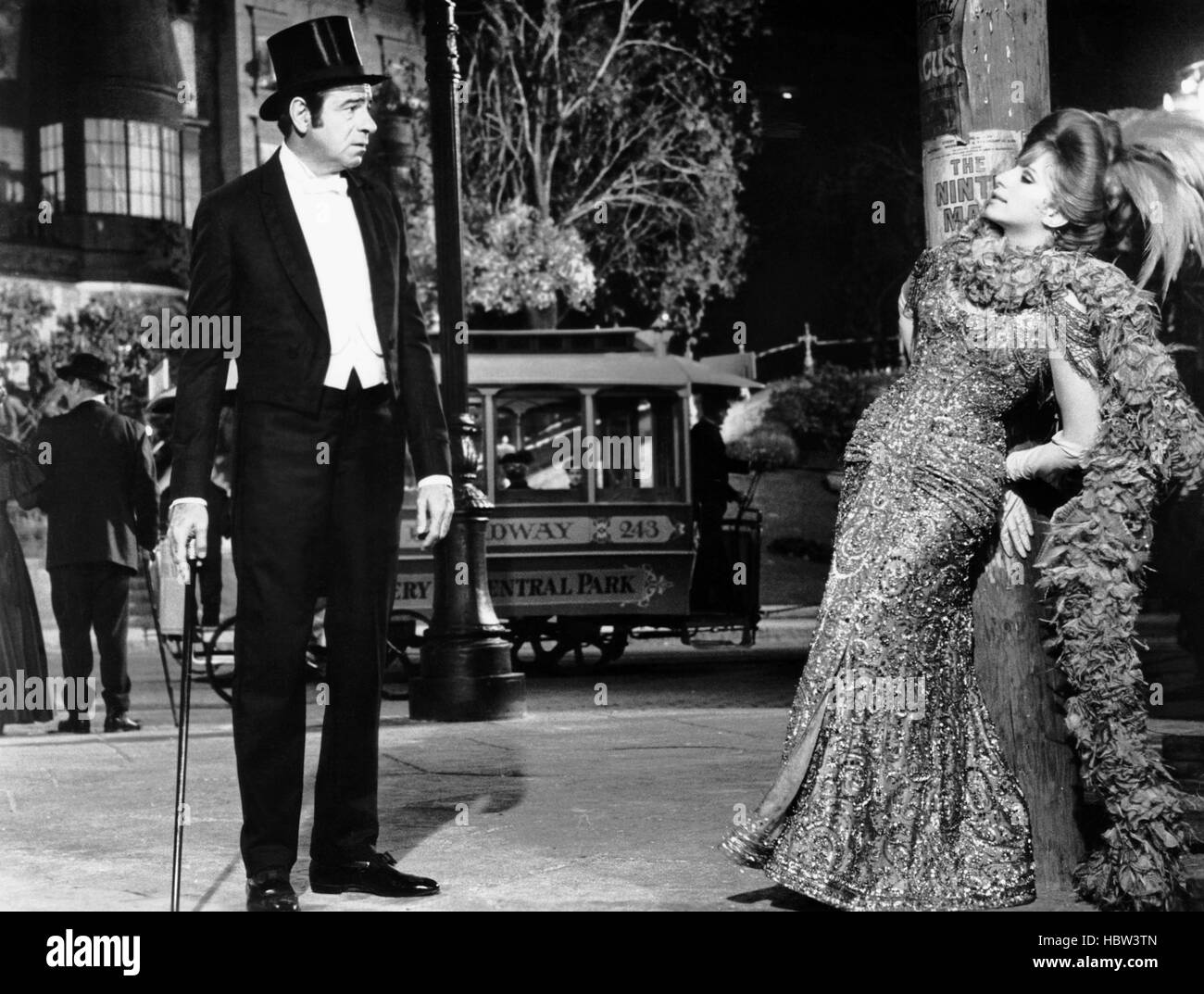 HELLO, DOLLY!, from left, Walter Matthau, Barbra Streisand, in a gown by Irene Sharaff, 1969, TM ...