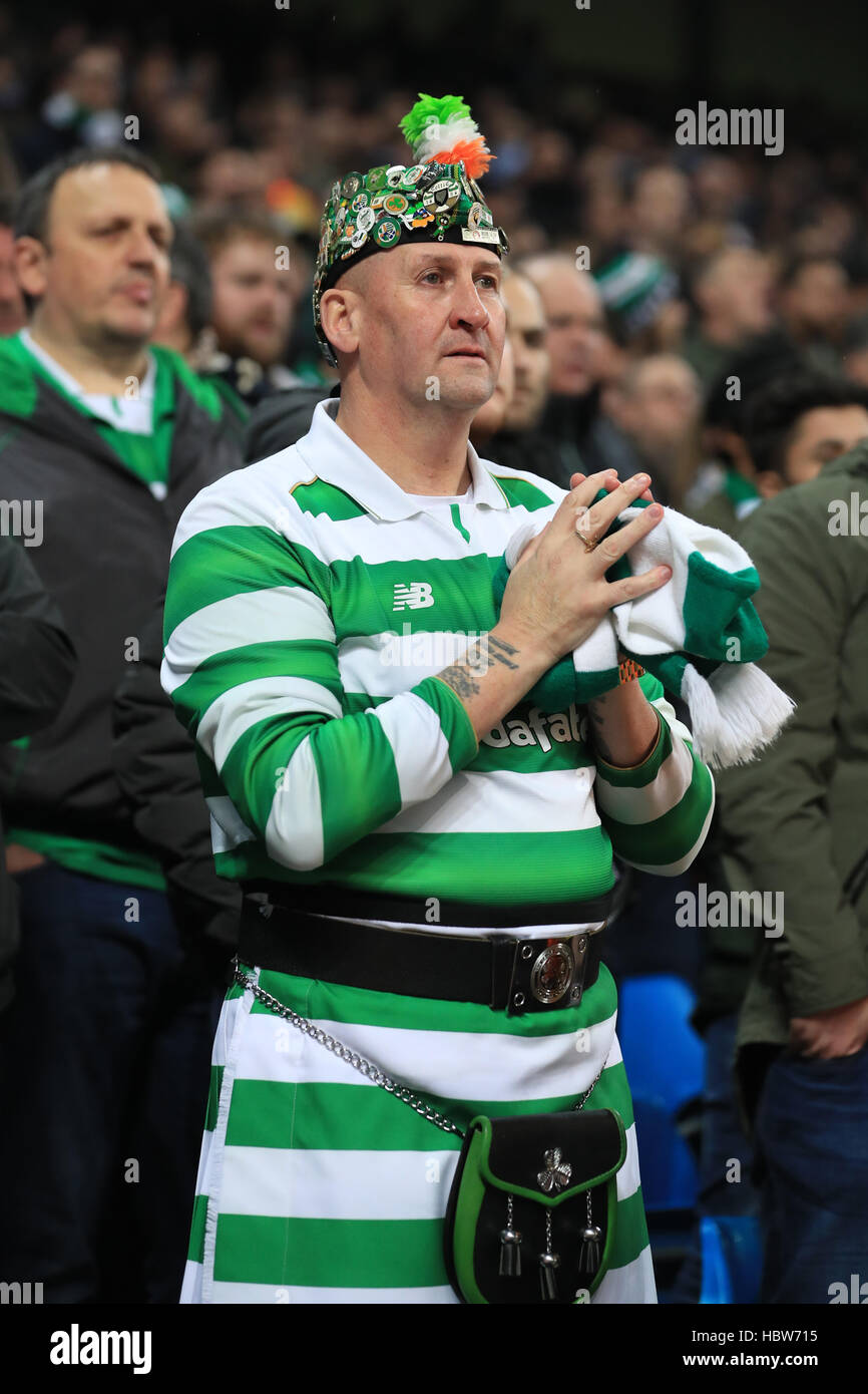 A Celtic fan shows his support in the stands during the UEFA Champions ...