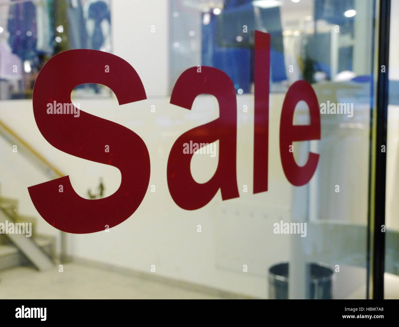 sale text on shopping window Stock Photo - Alamy