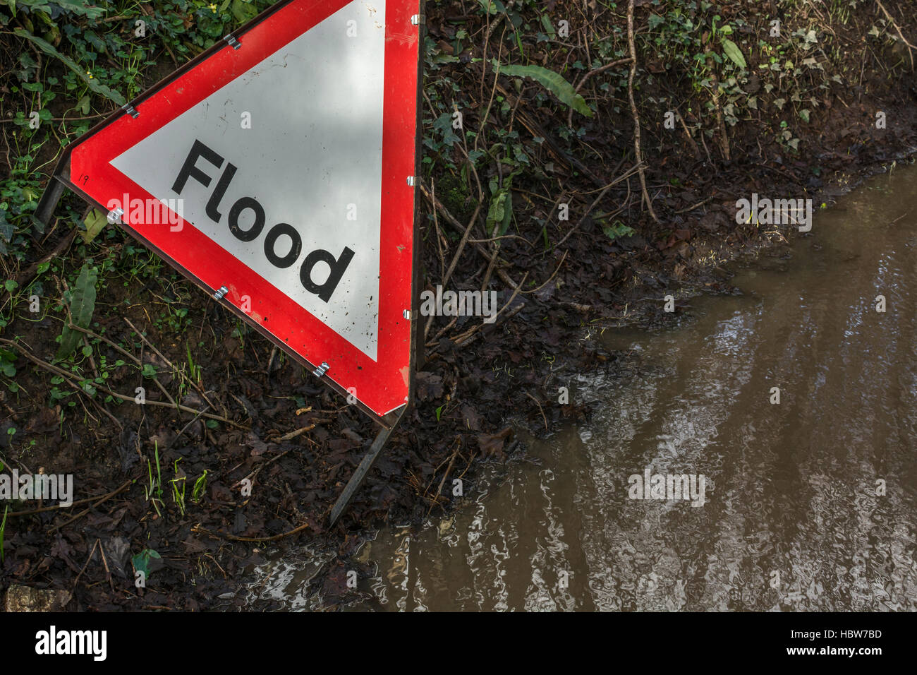 Triangular flood warning sign hi-res stock photography and images - Alamy