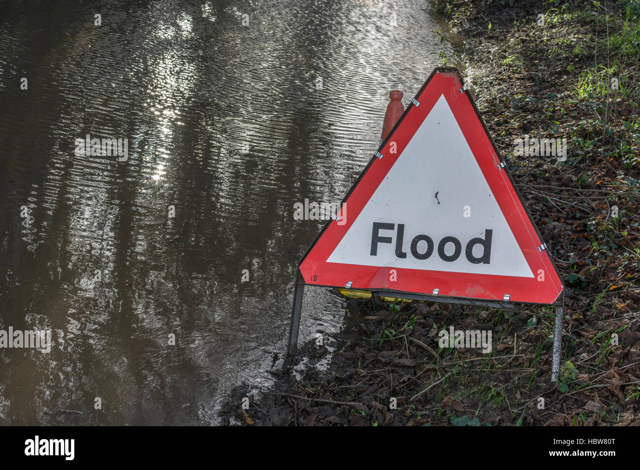 Triangular flood warning sign hi-res stock photography and images - Alamy