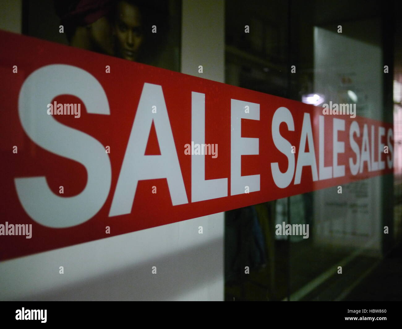 Sale Sign On Glass Window Stock Photo - Alamy