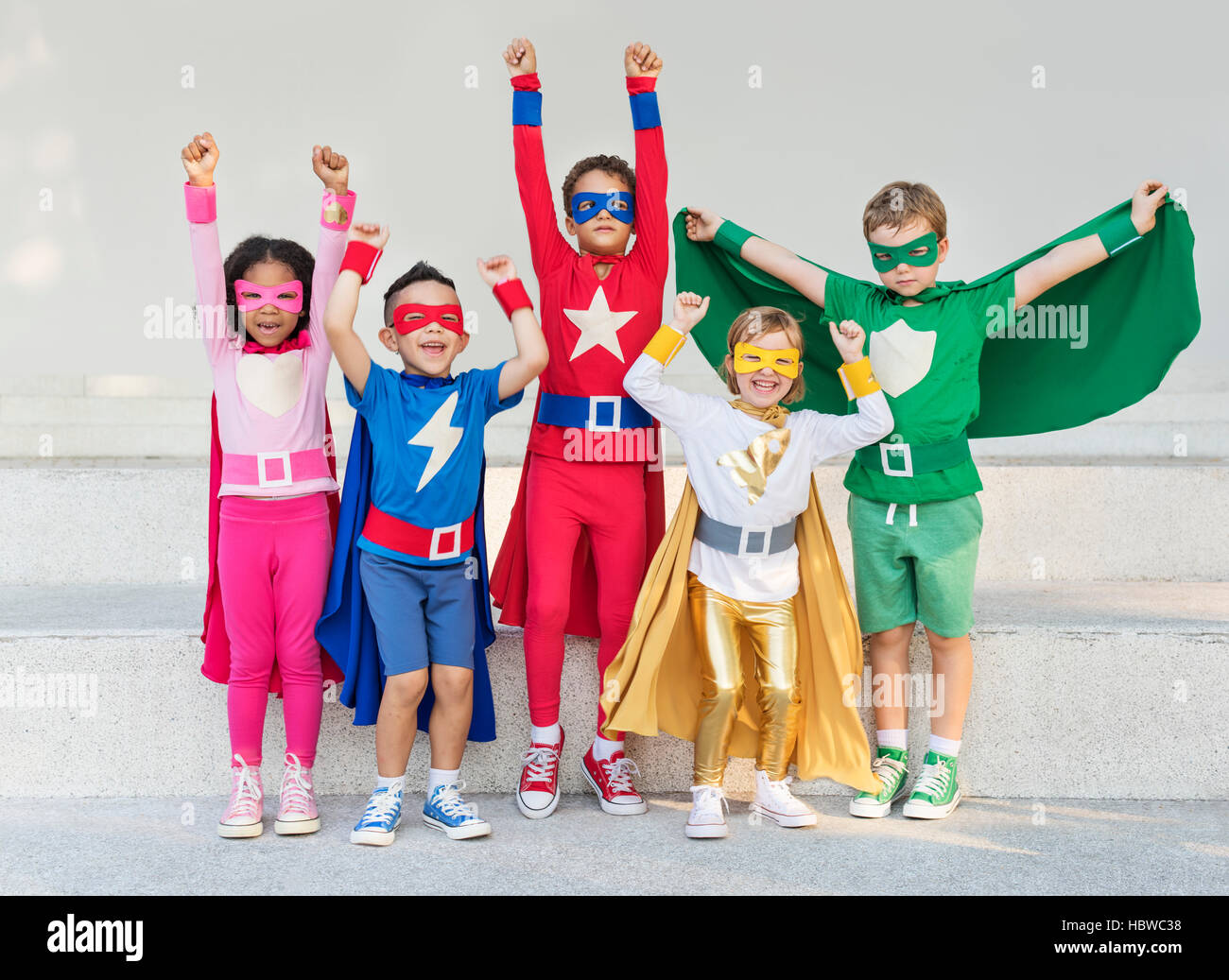 Superheroes Cheerful Kids Expressing Positivity Concept Stock Photo - Alamy