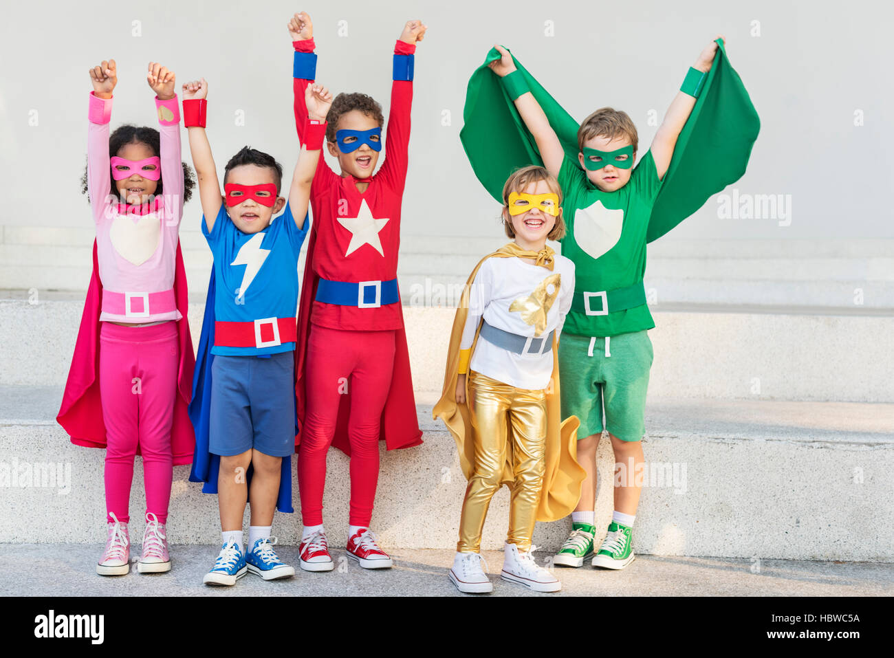 Superheroes Cheerful Kids Expressing Positivity Concept Stock Photo - Alamy