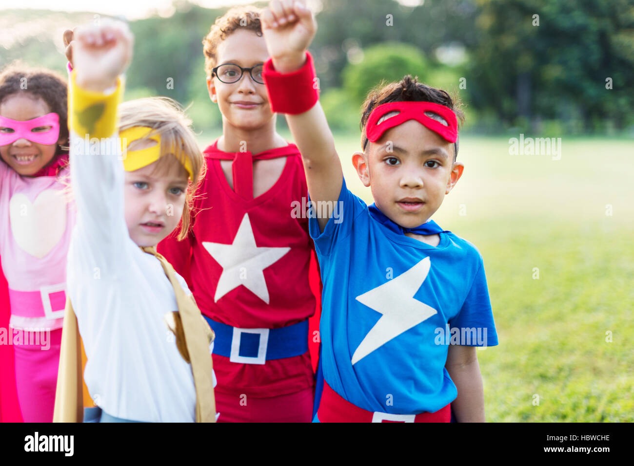 Superheroes Cheerful Kids Expressing Positivity Concept Stock Photo - Alamy
