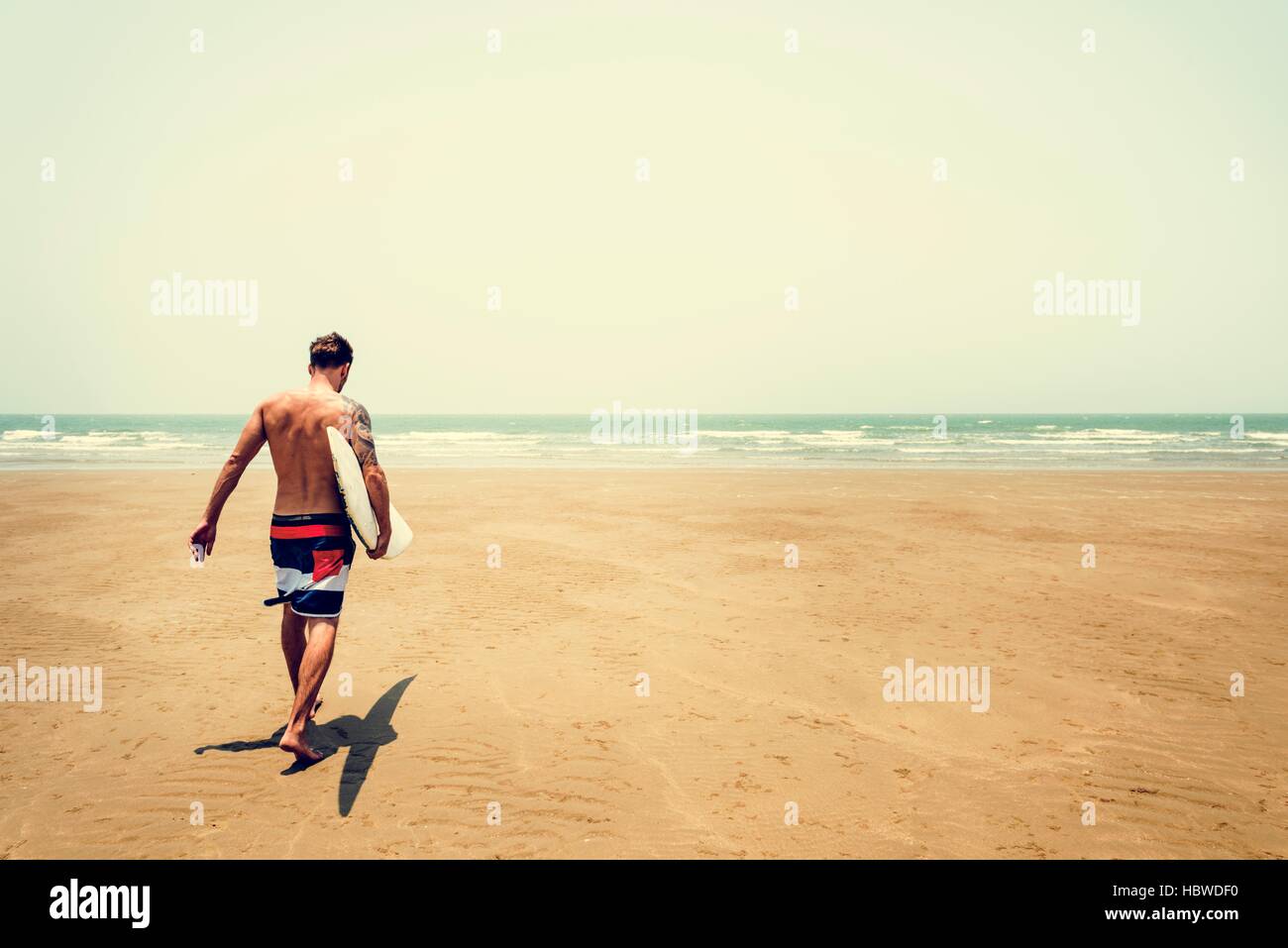 Man Beach Summer Holiday Vacation Surfing Concept Stock Photo - Alamy
