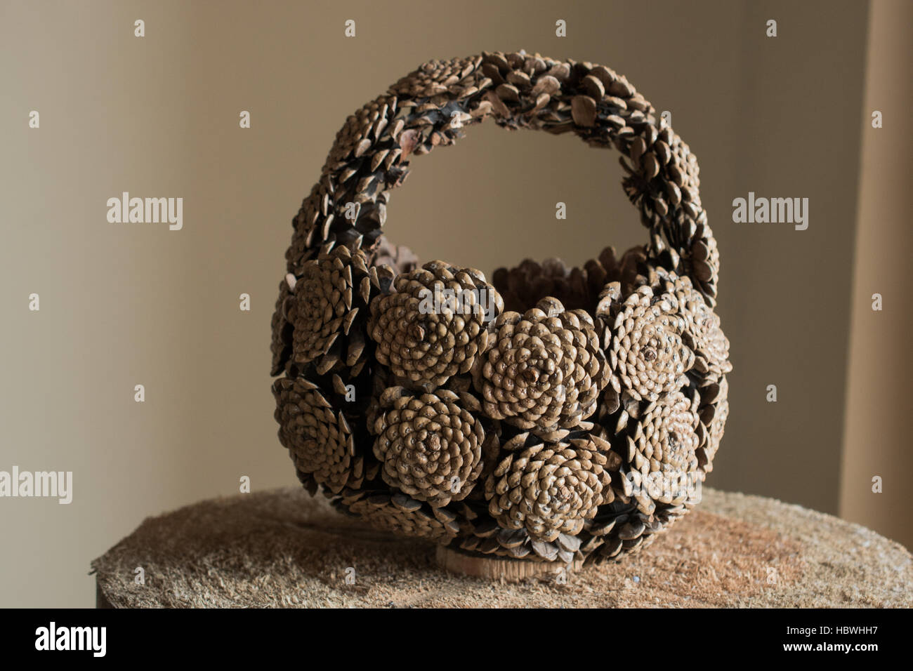Basket of pine cones hi-res stock photography and images - Alamy