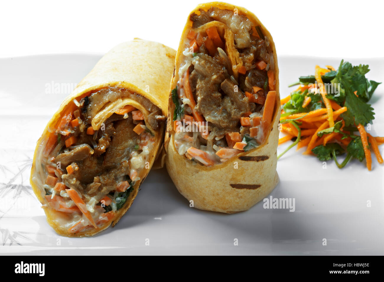 Burrito with grilled meat closeup Stock Photo - Alamy