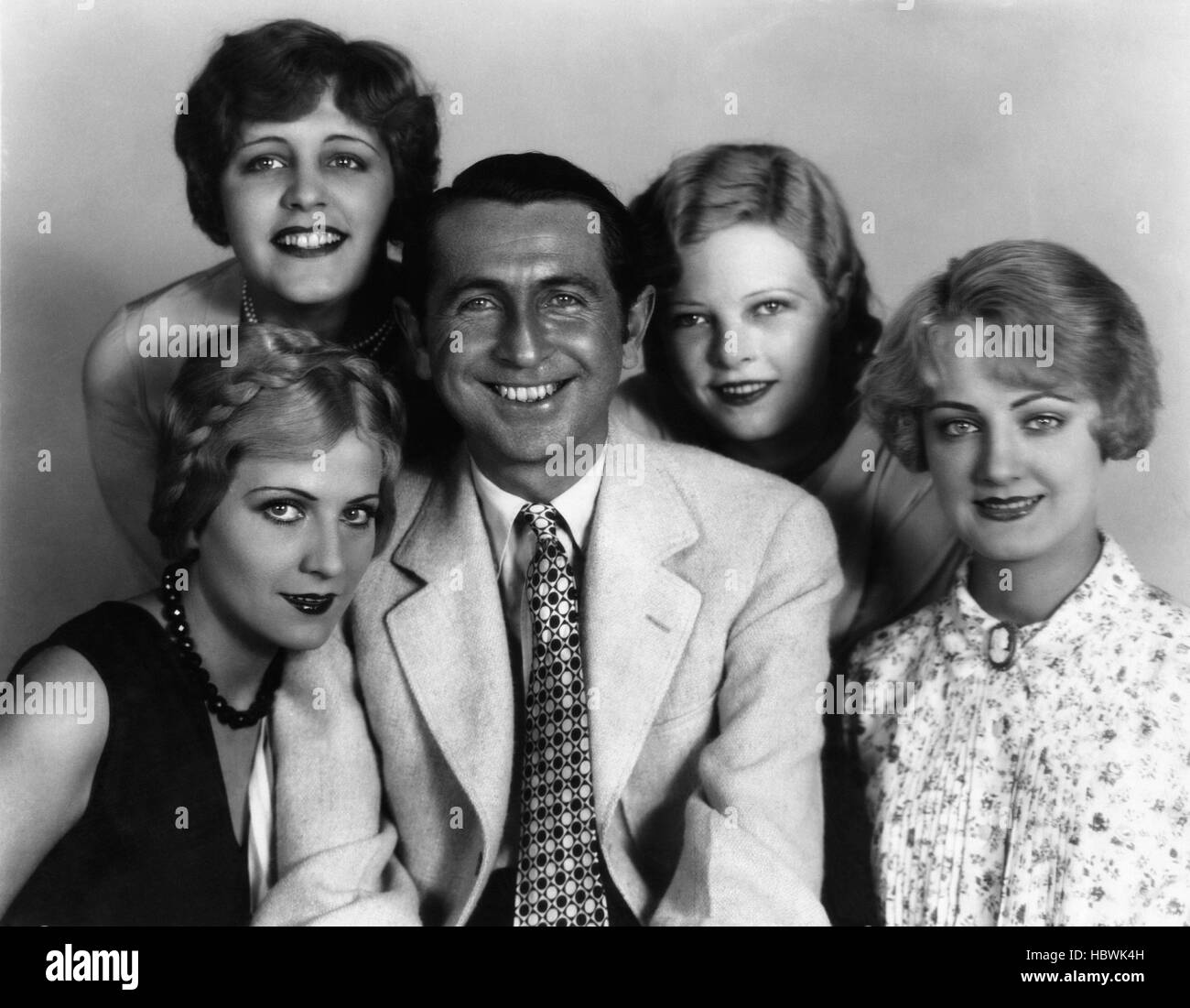 GENTLEMEN PREFER BLONDES, director Malcolm St. Clair, surrounded by ...