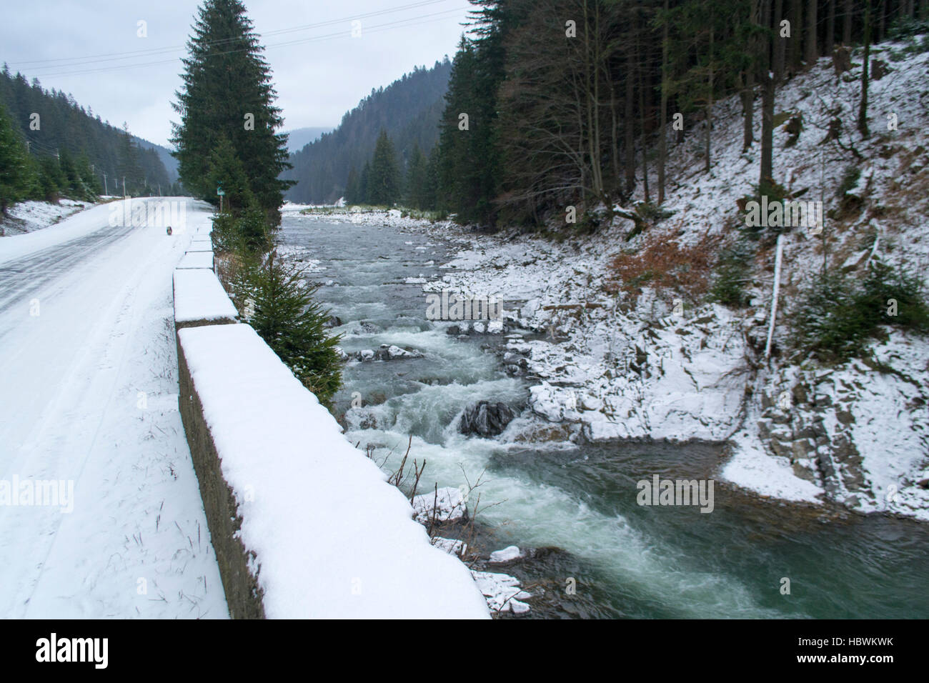Road next to mountain river Stock Photo - Alamy