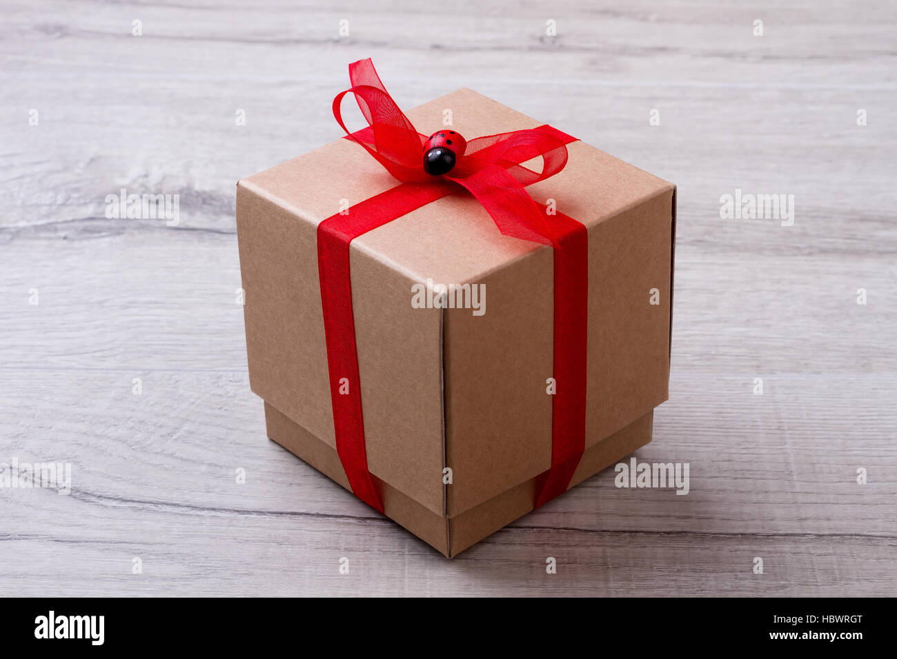 Square gift box with ribbon Stock Photo - Alamy