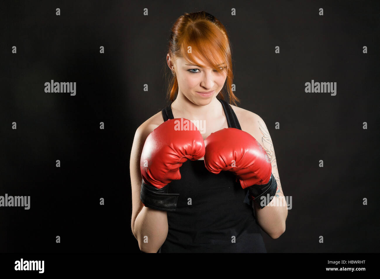 Muscular black female boxer punch hi-res stock photography and images ...